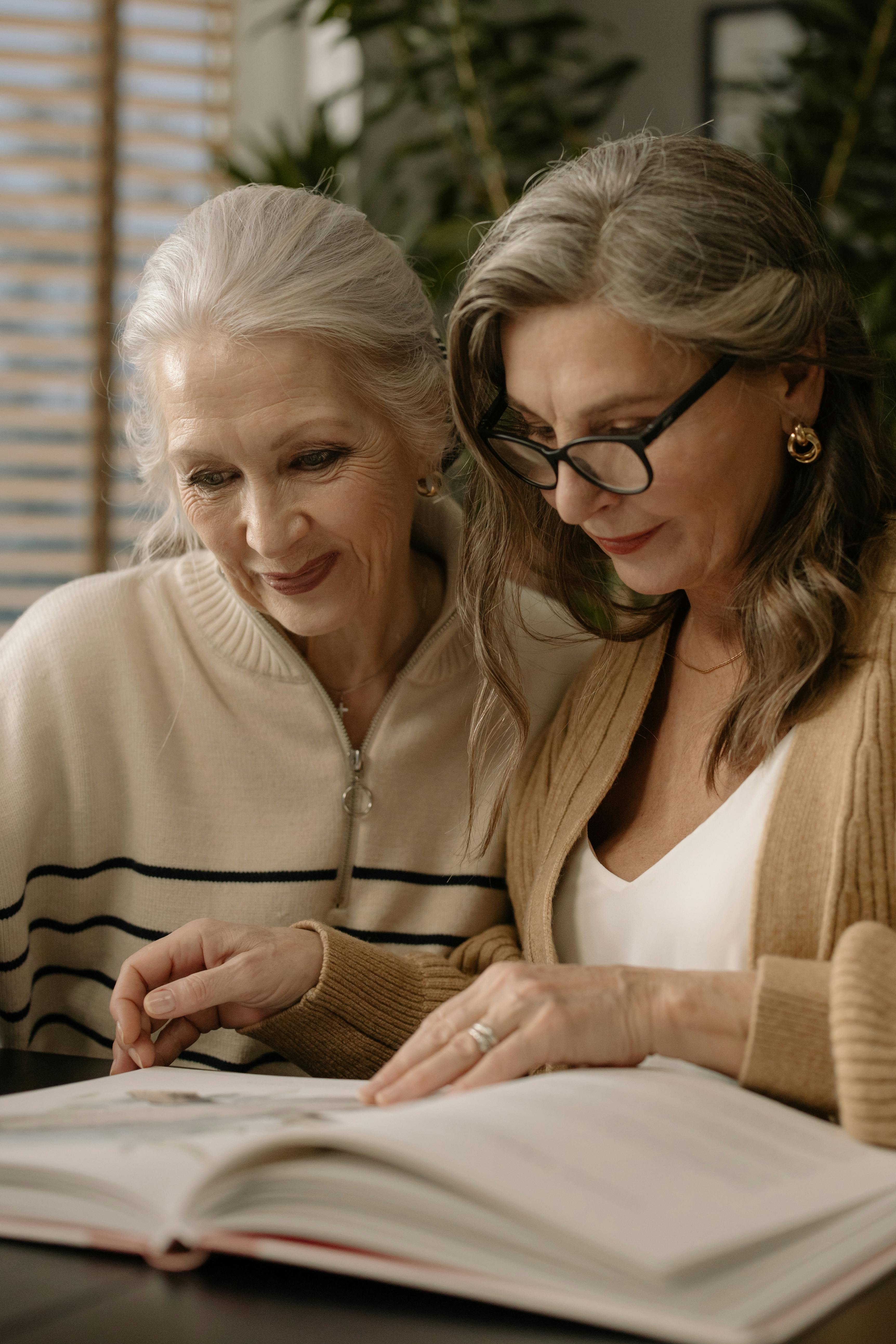Women Reading a Book · Free Stock Photo