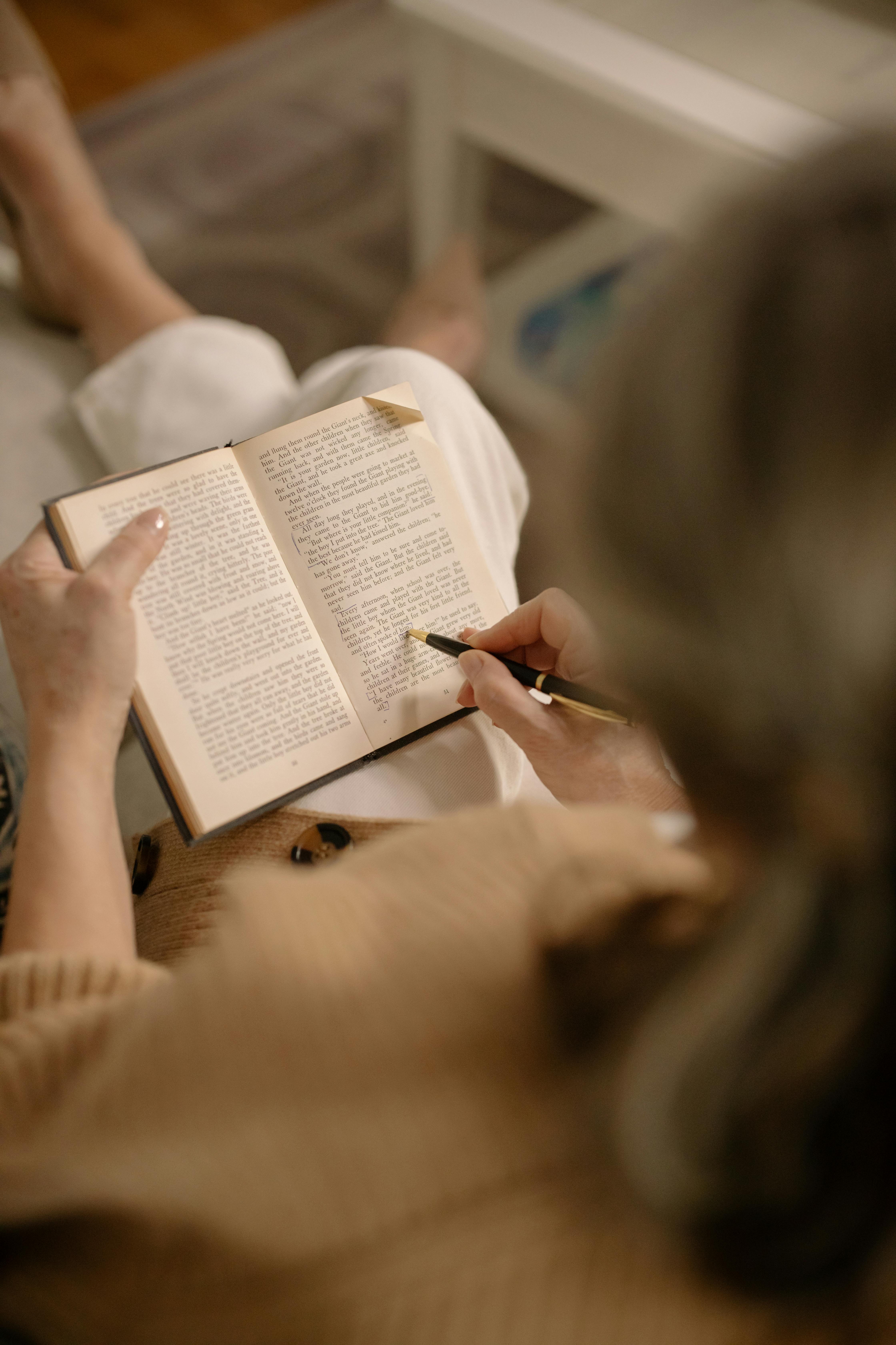 Person Reading a Book · Free Stock Photo
