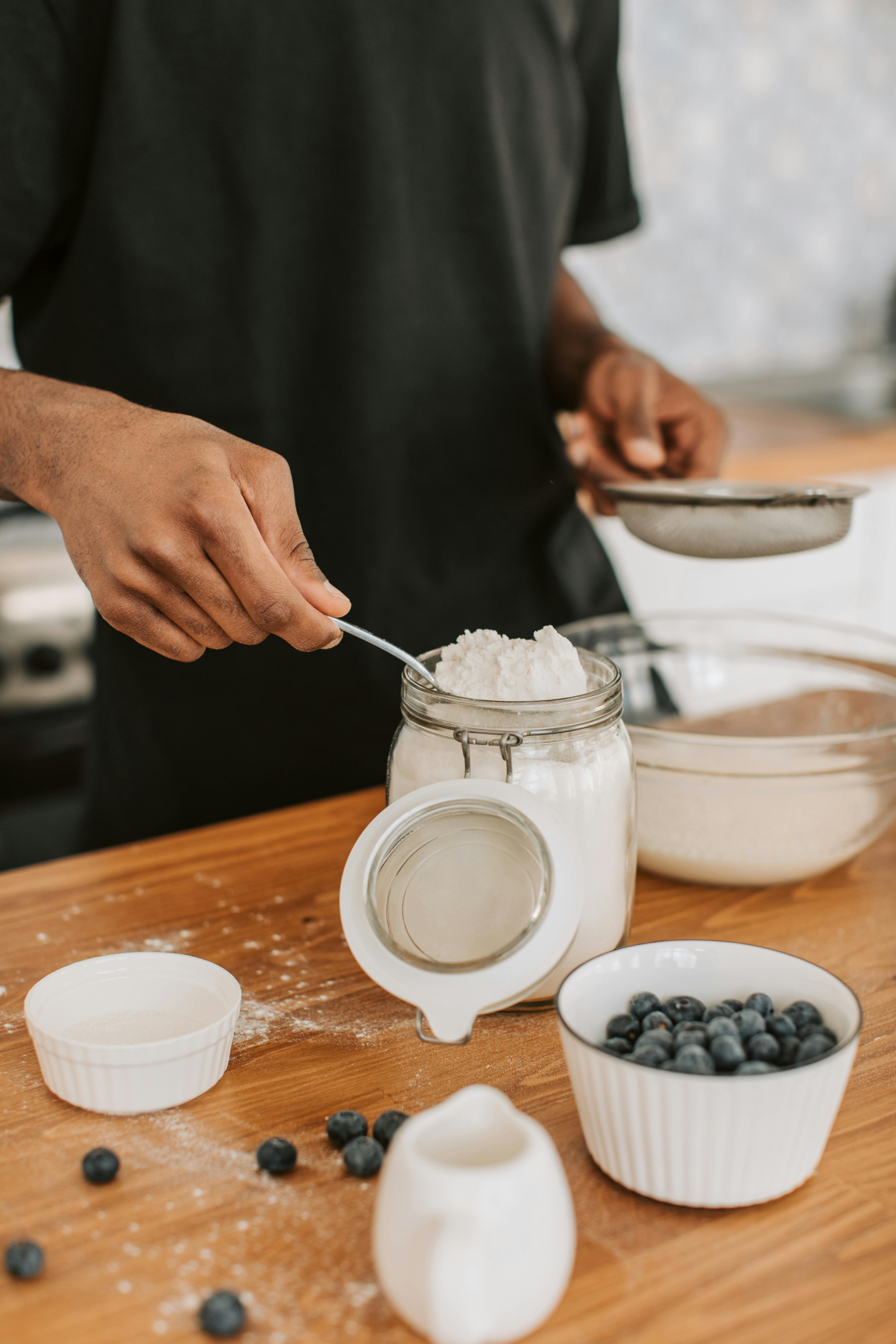 People Sifting Flour · Free Stock Photo