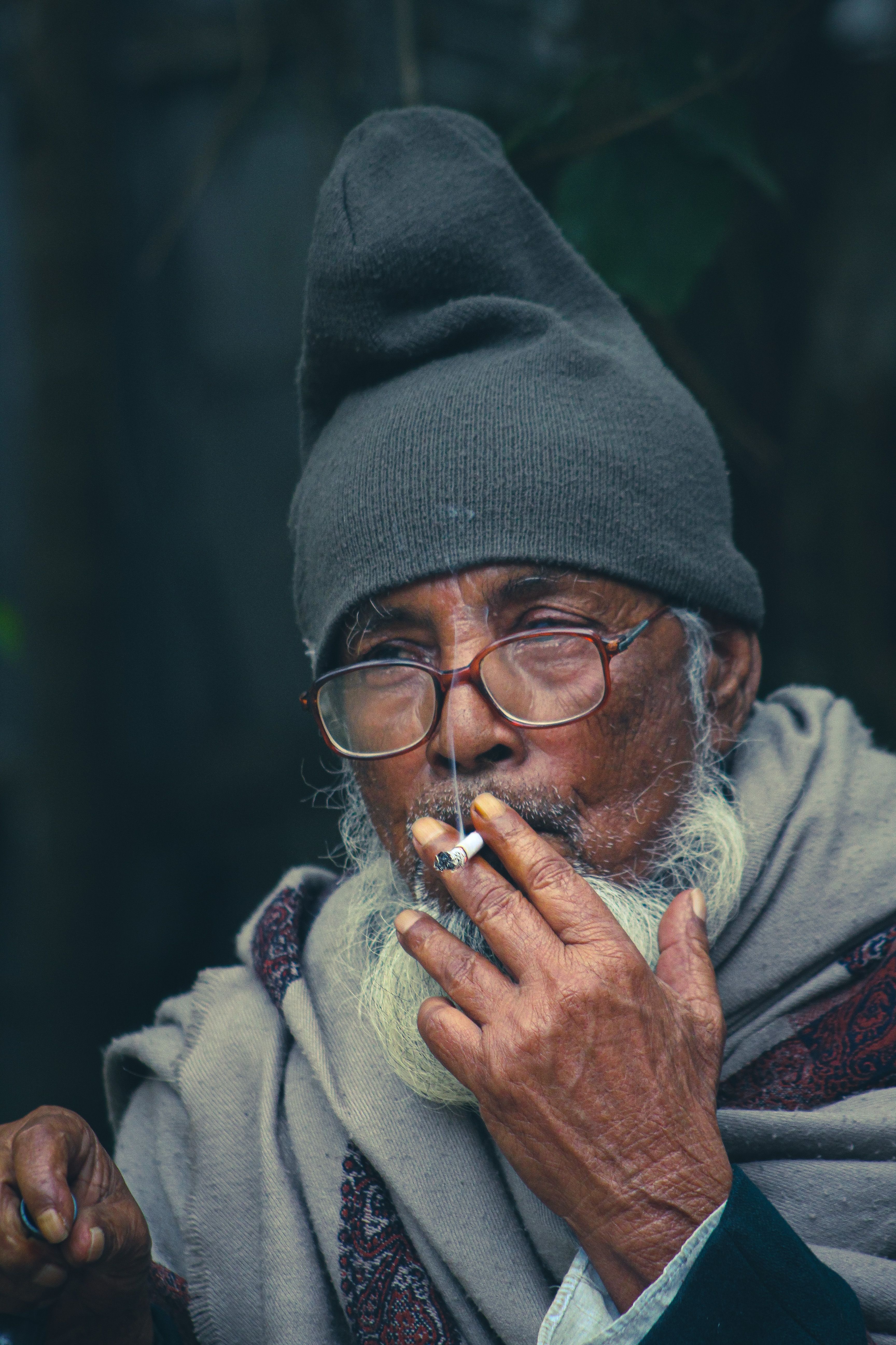 Portrait of Person Smoking a Cigarette · Free Stock Photo