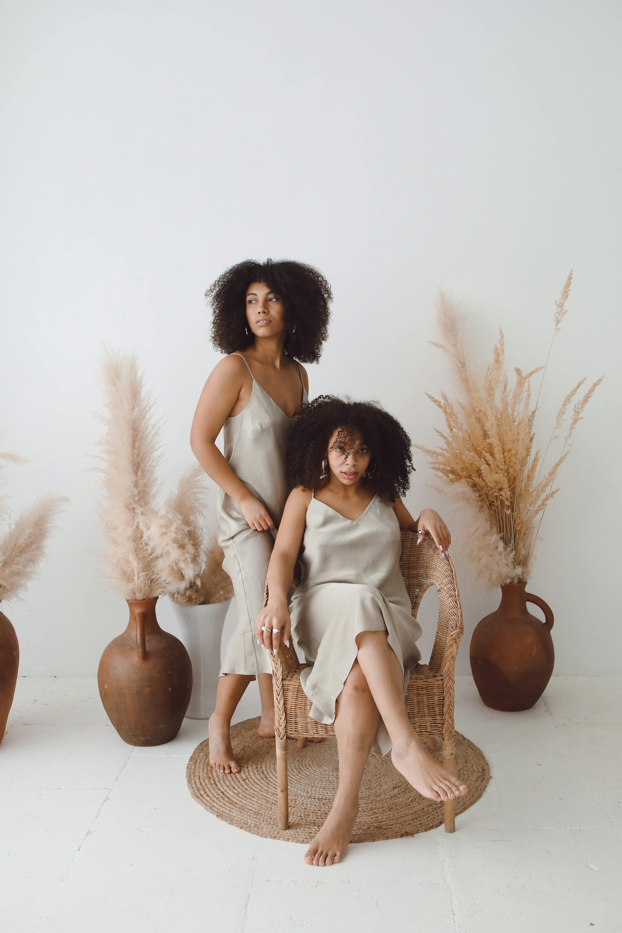 Two Afro-Haired Women in Beige Dress · Free Stock Photo