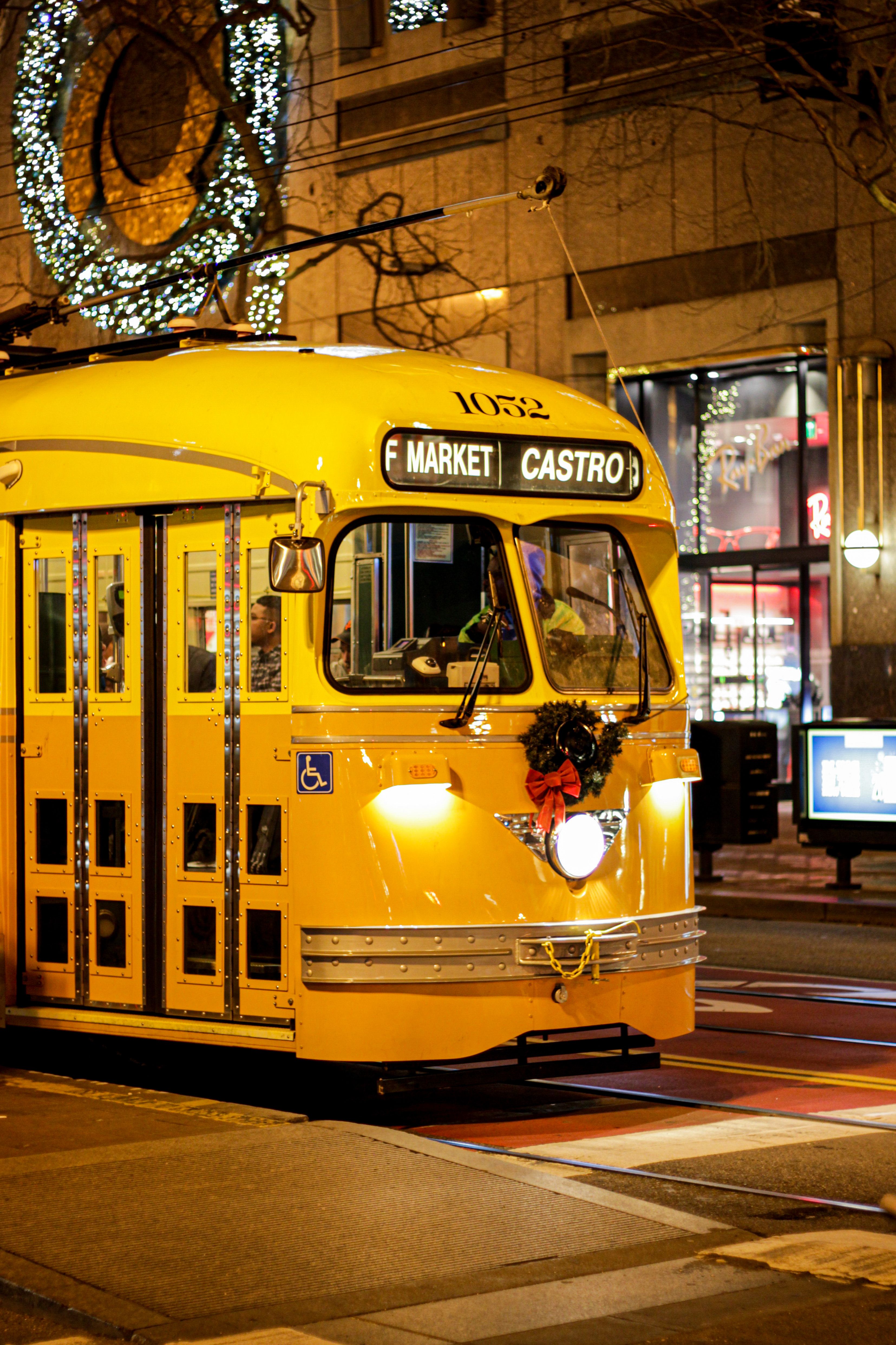 A Yellow Tramway Moving on the Road · Free Stock Photo
