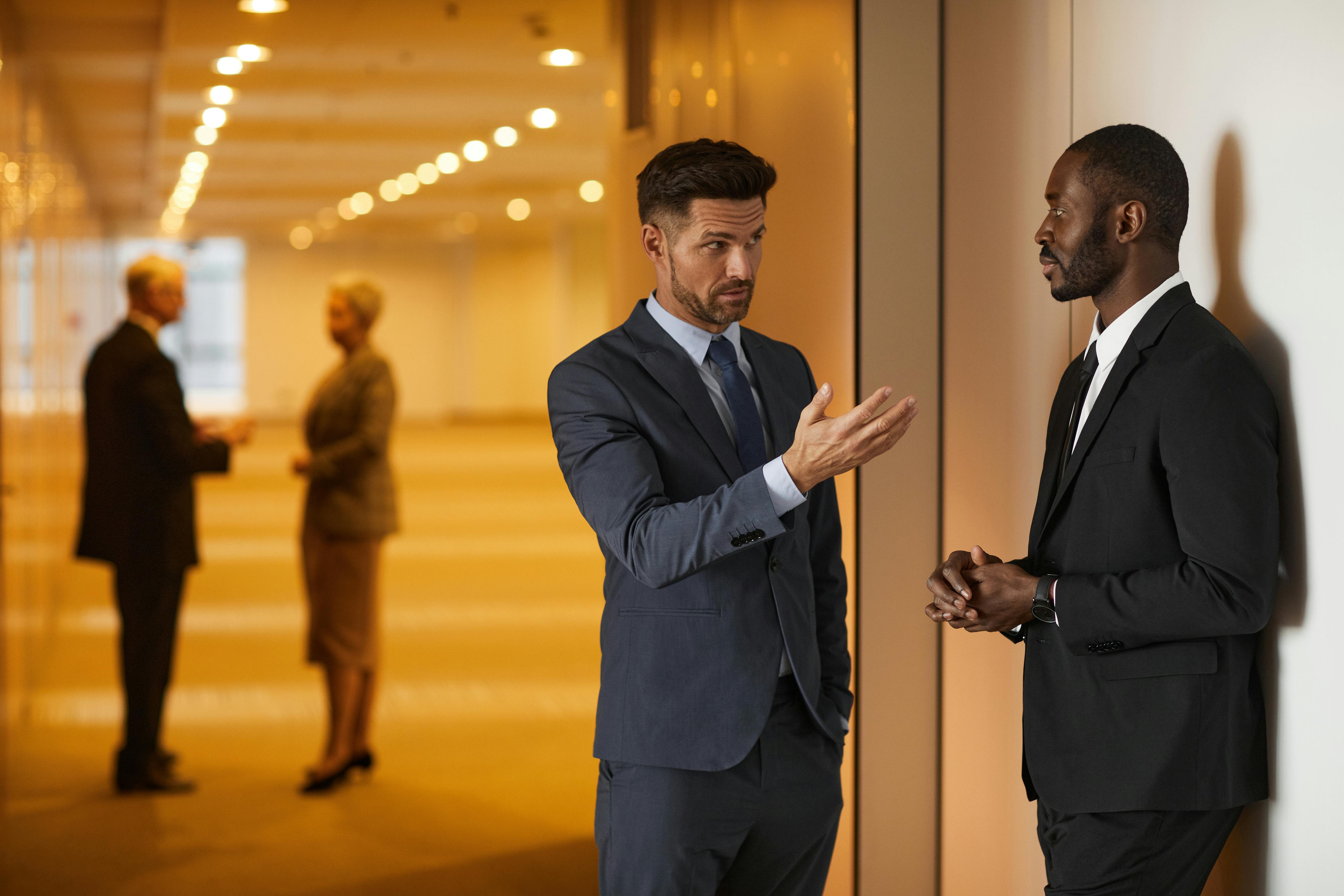 Men in Suits having Conversation · Free Stock Photo