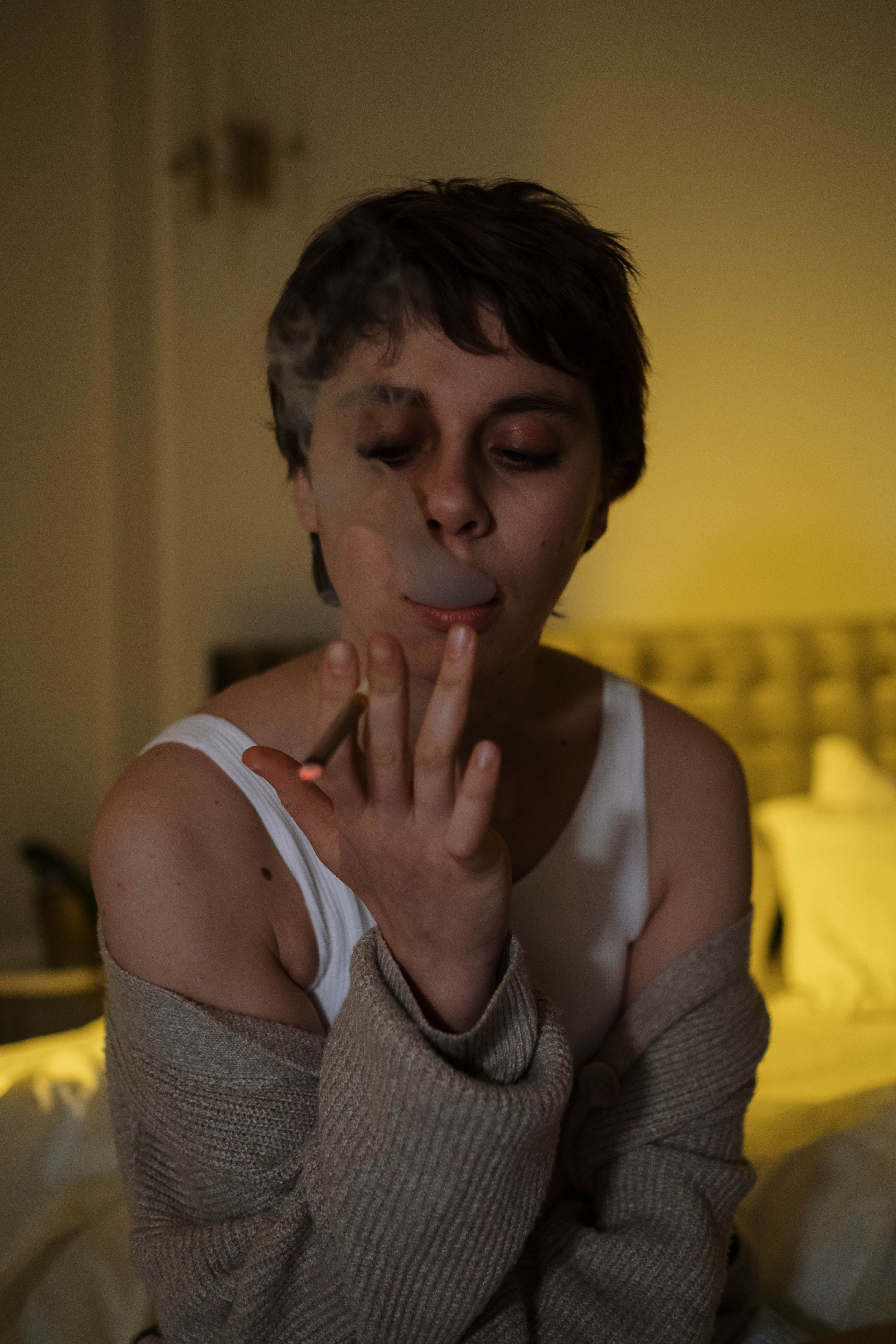 Photo of a Woman Smoking a Cigarette · Free Stock Photo