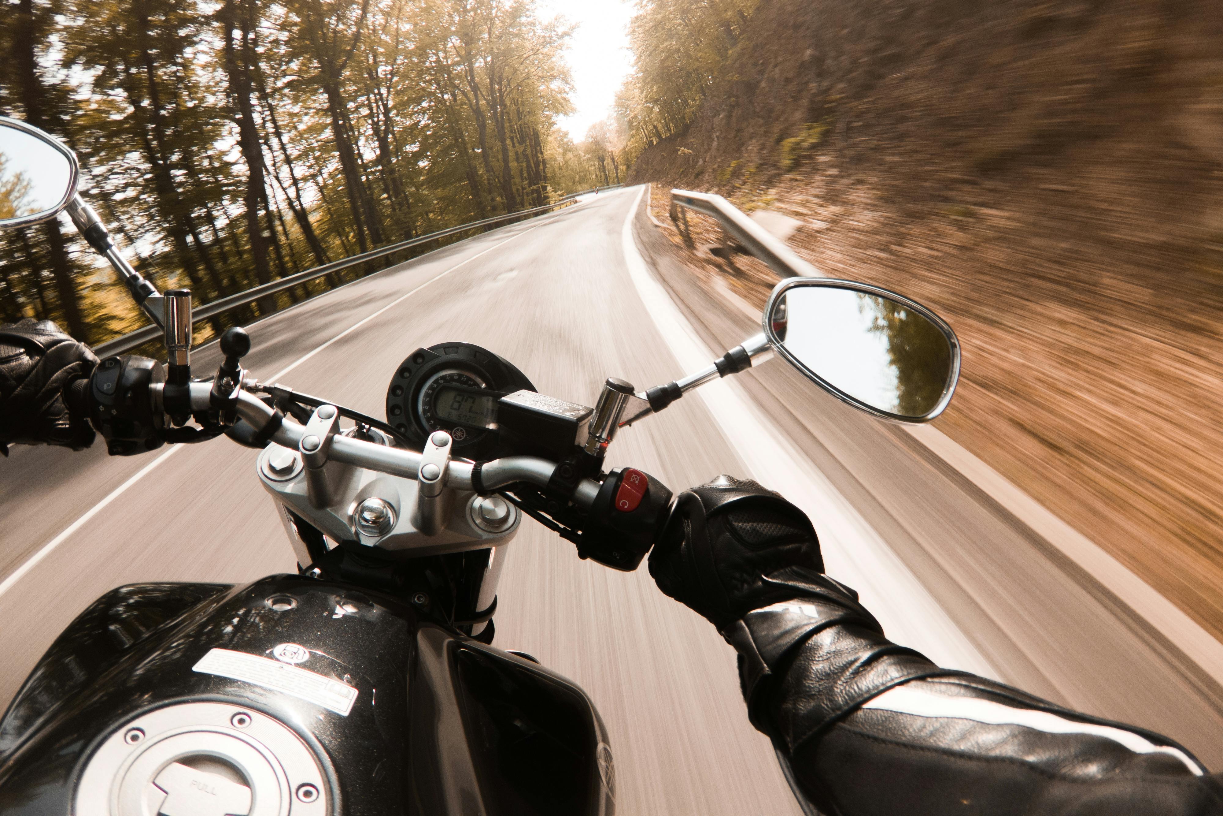 A Person Driving a Motorcycle · Free Stock Photo
