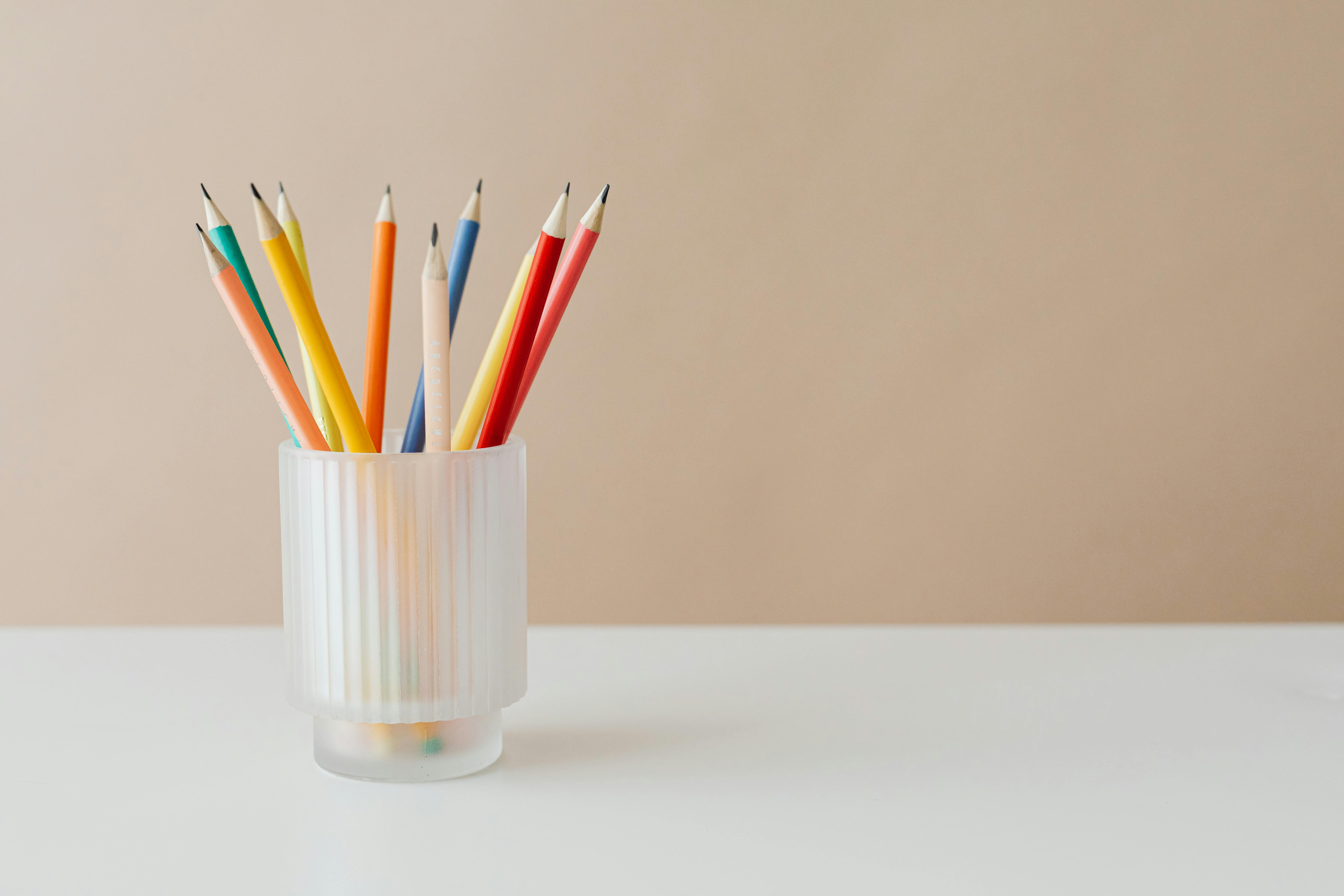 Colored Pencils on a Glass · Free Stock Photo