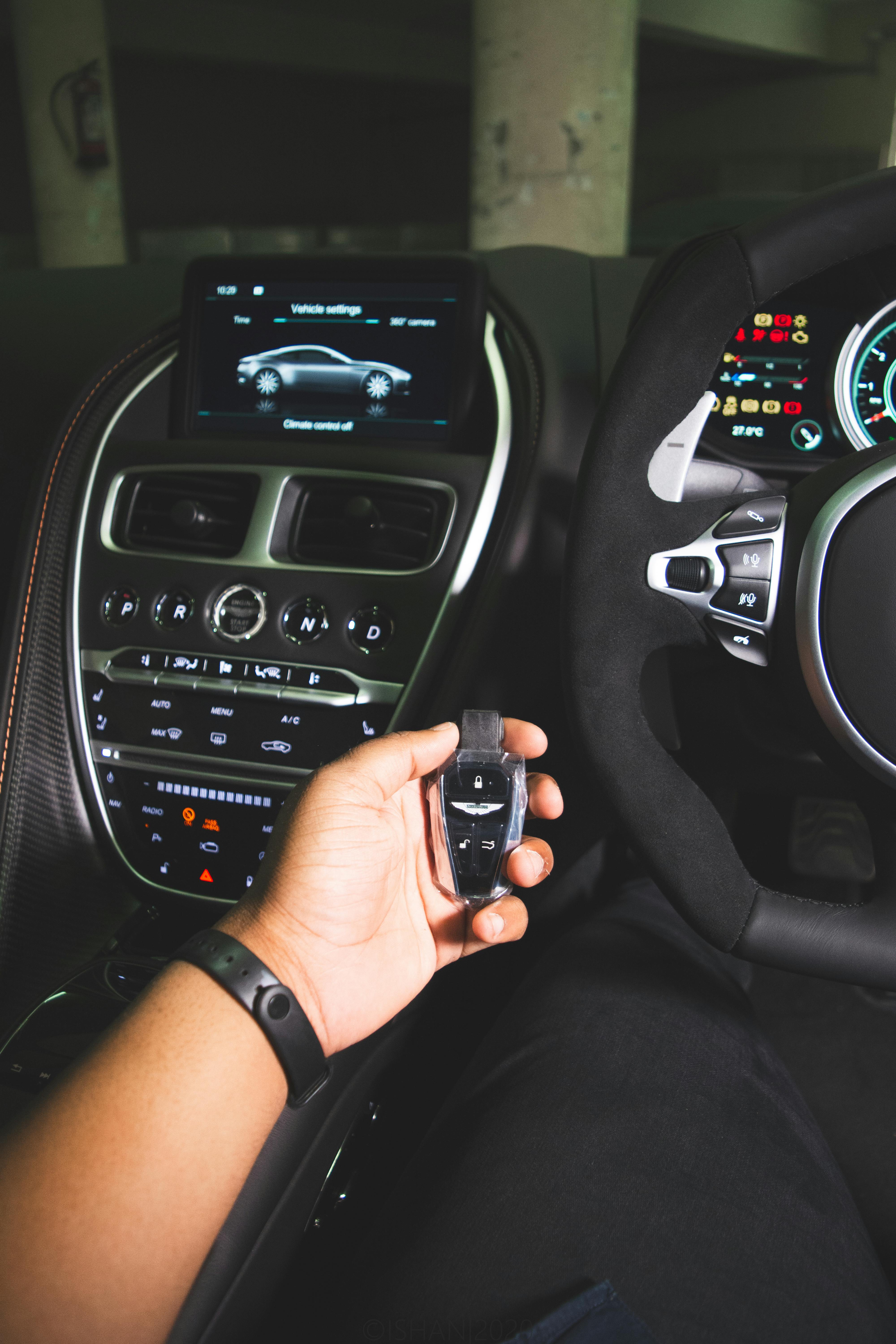 Aston Martin Remote Control in Hand · Free Stock Photo