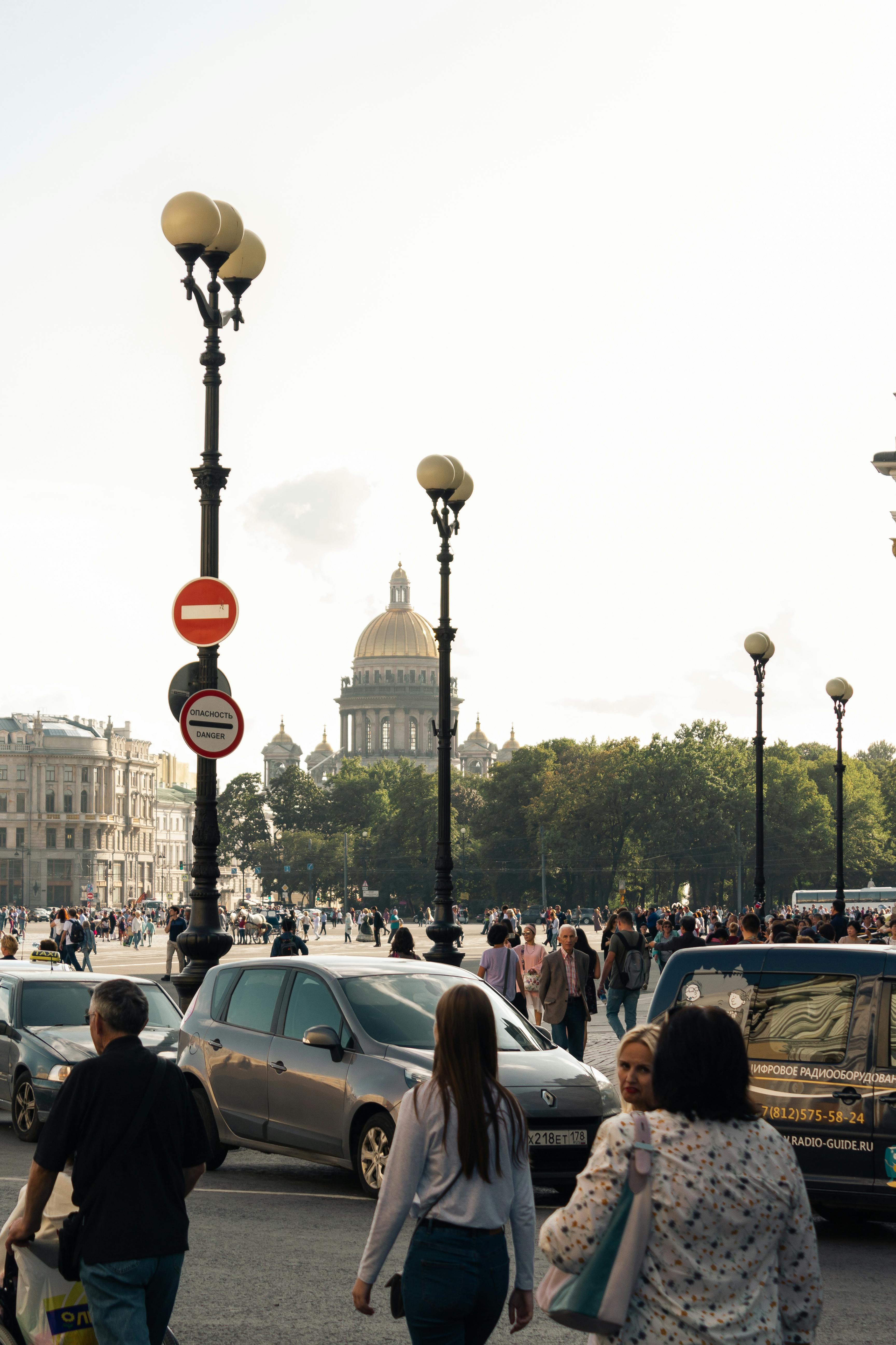 People Walking through Gate · Free Stock Photo