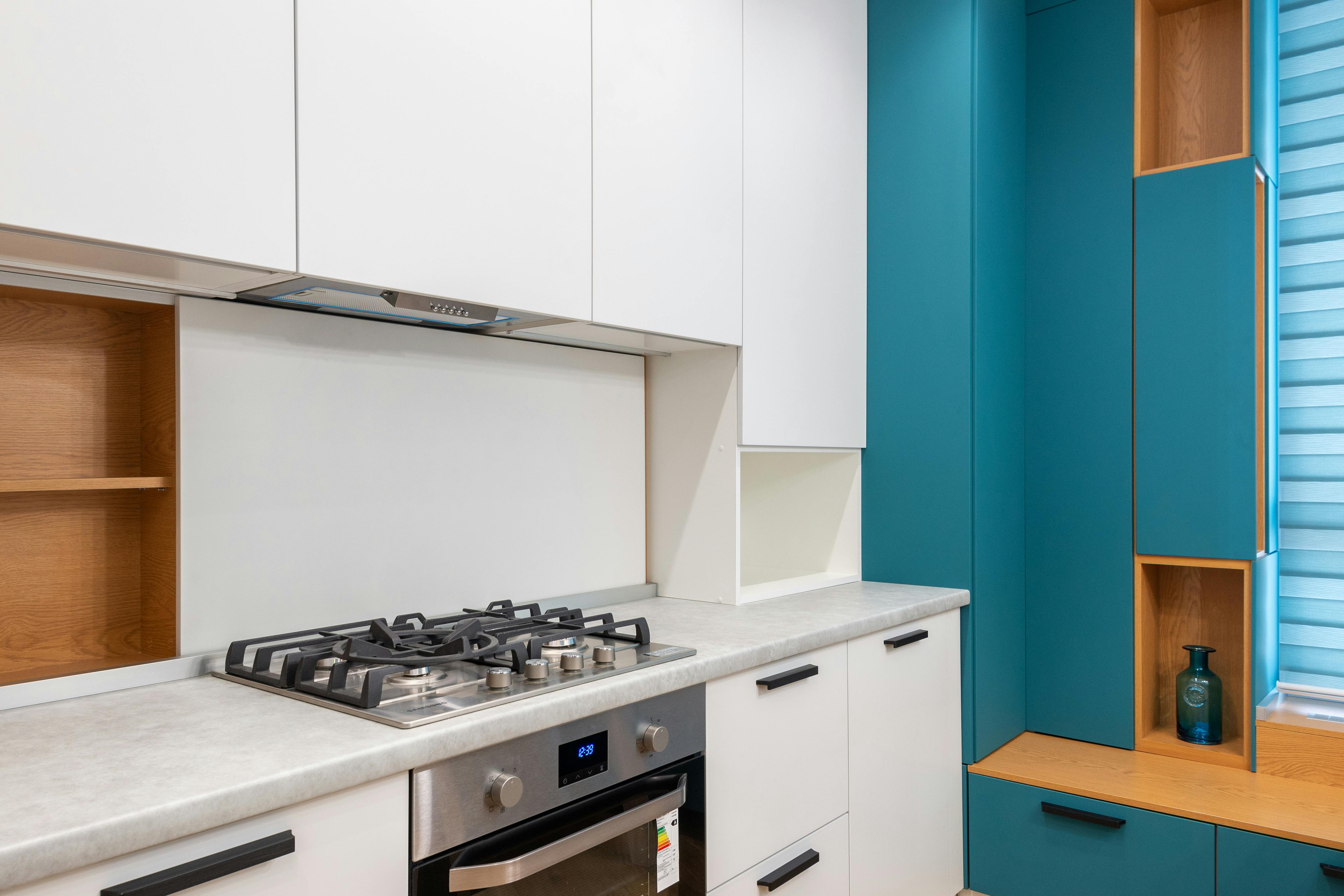 Modern kitchen interior with gas stove and oven at home · Free Stock Photo