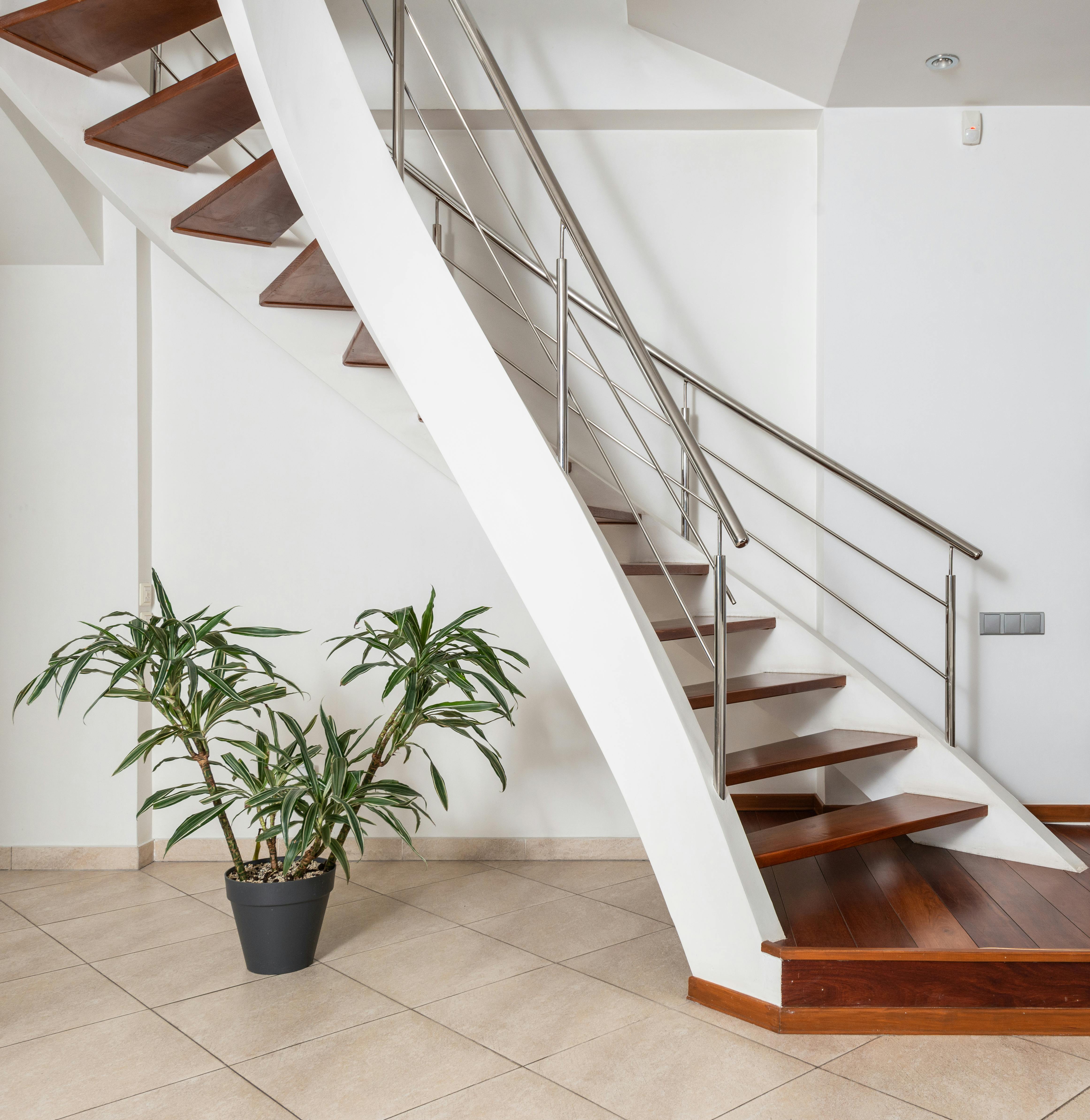 Stairs in form of triangle in house · Free Stock Photo