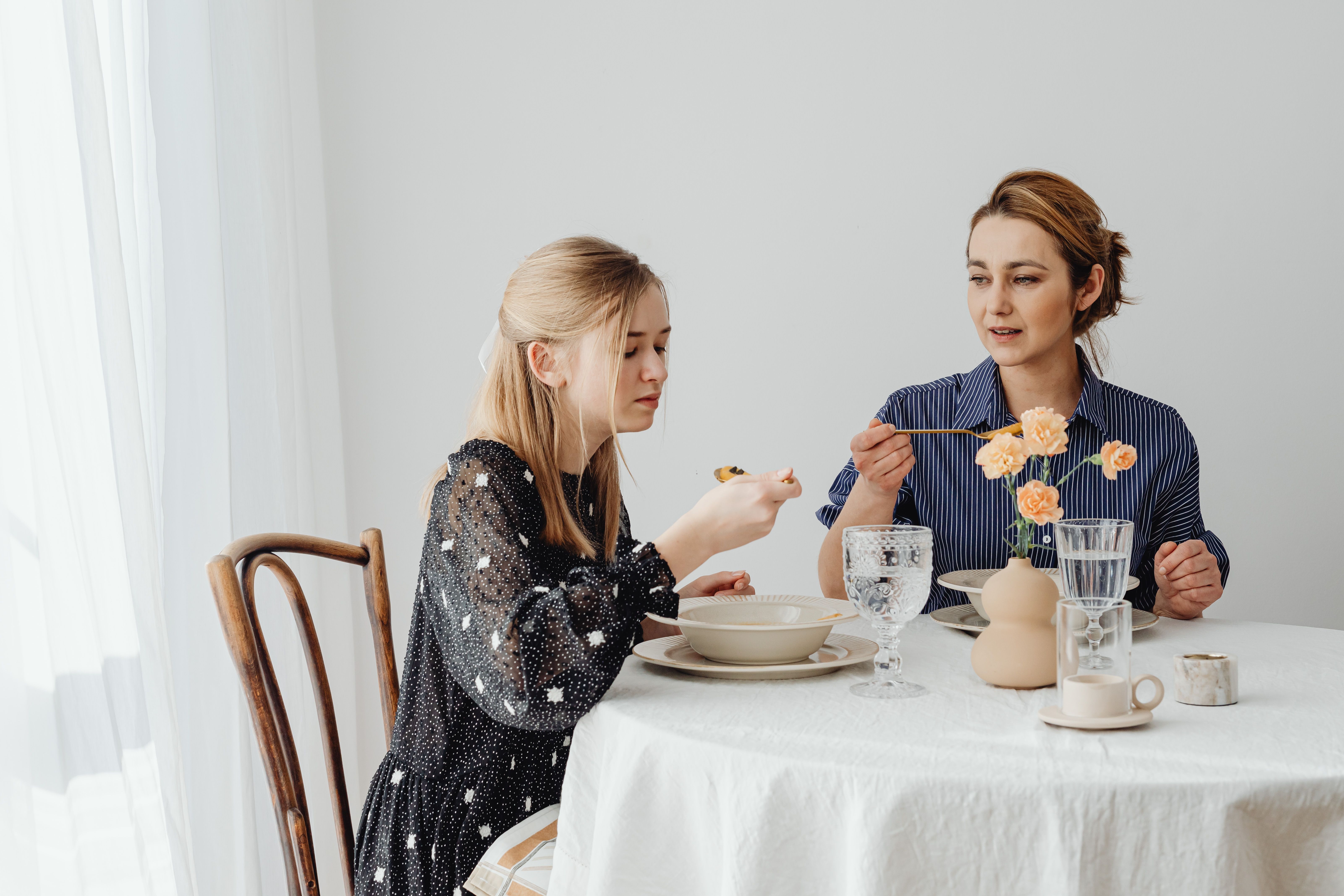 Women Eating in a Dining Area · Free Stock Photo