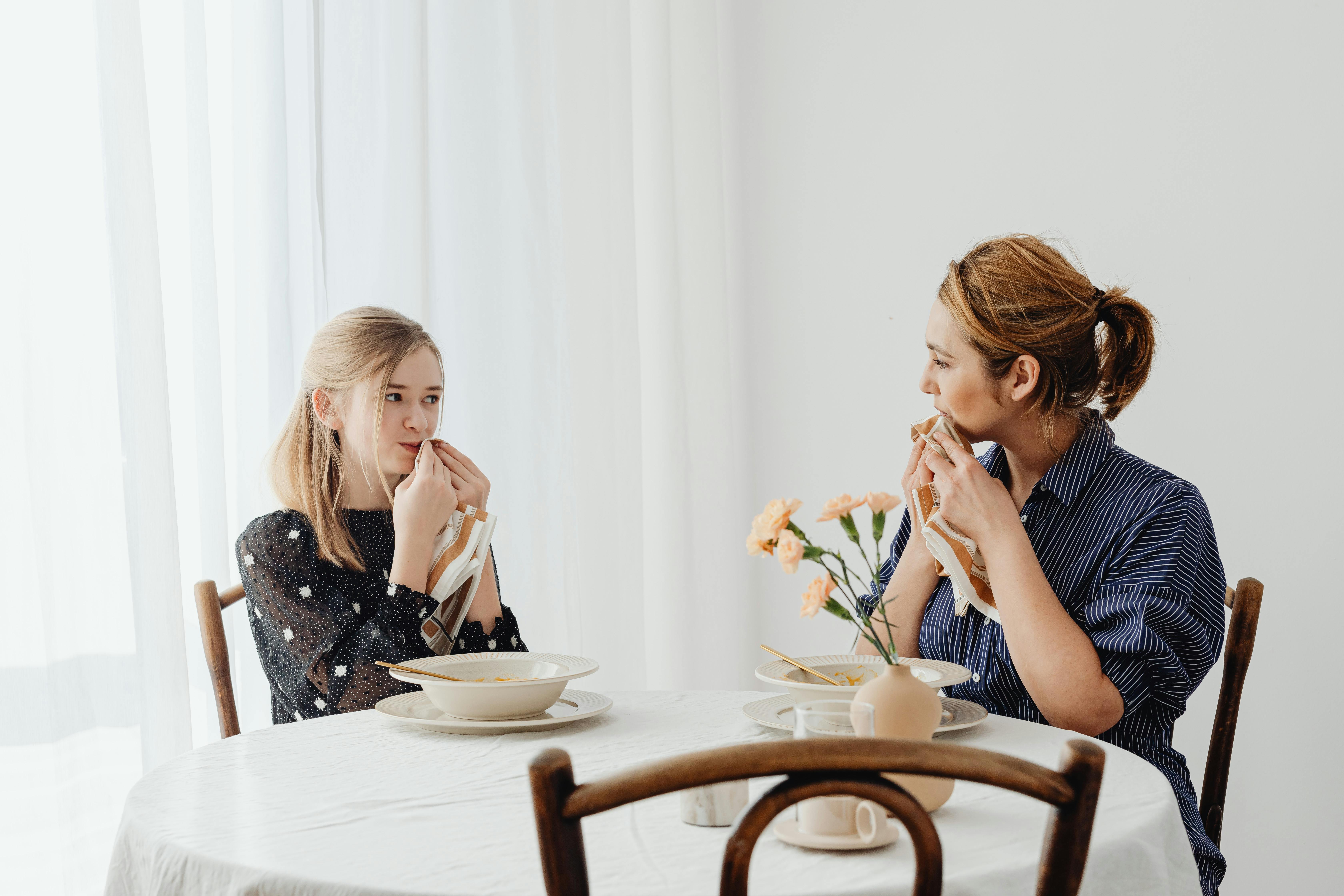 Women Eating in a Dining Area · Free Stock Photo