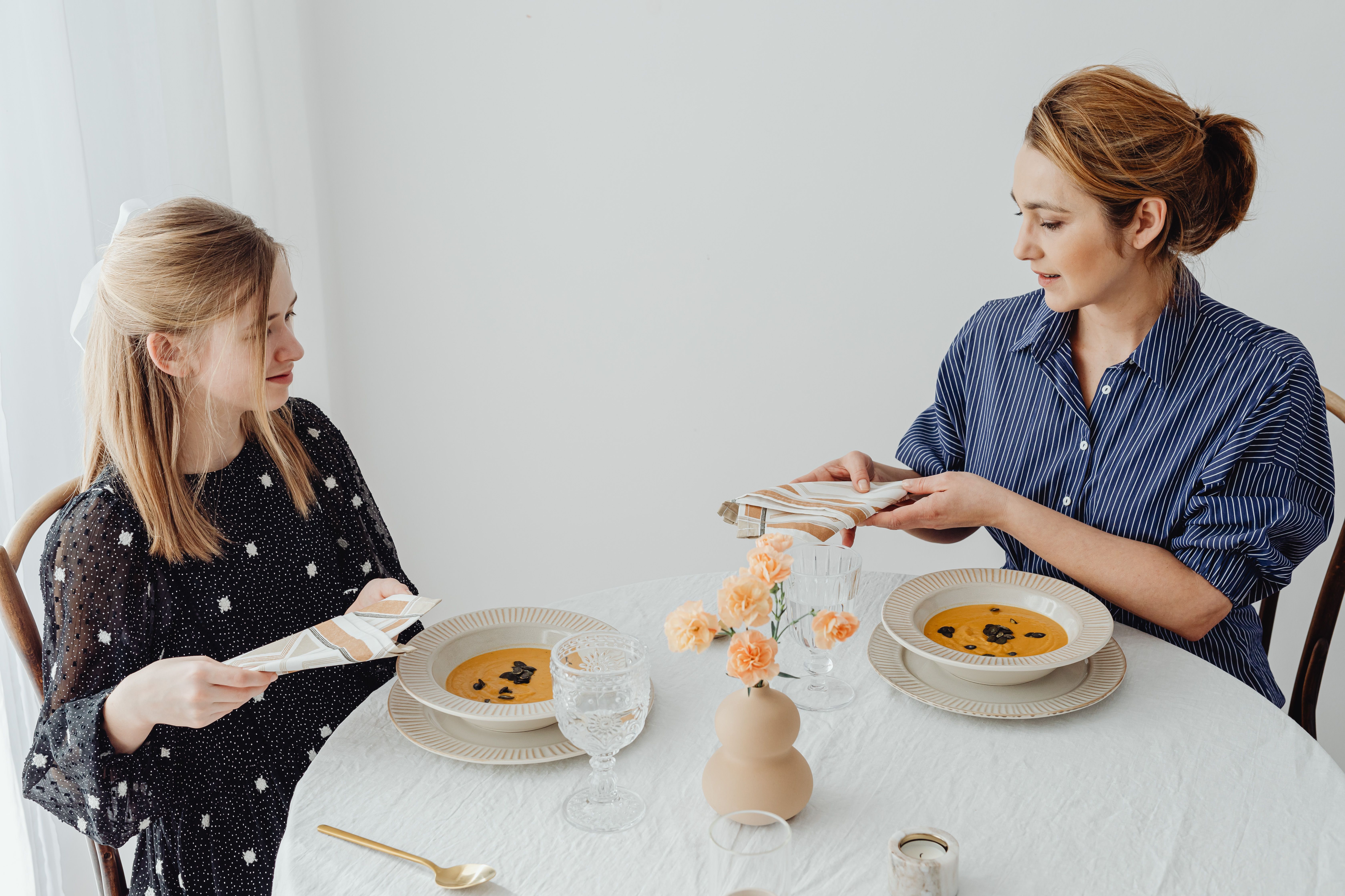 Women Eating in a Dining Area · Free Stock Photo