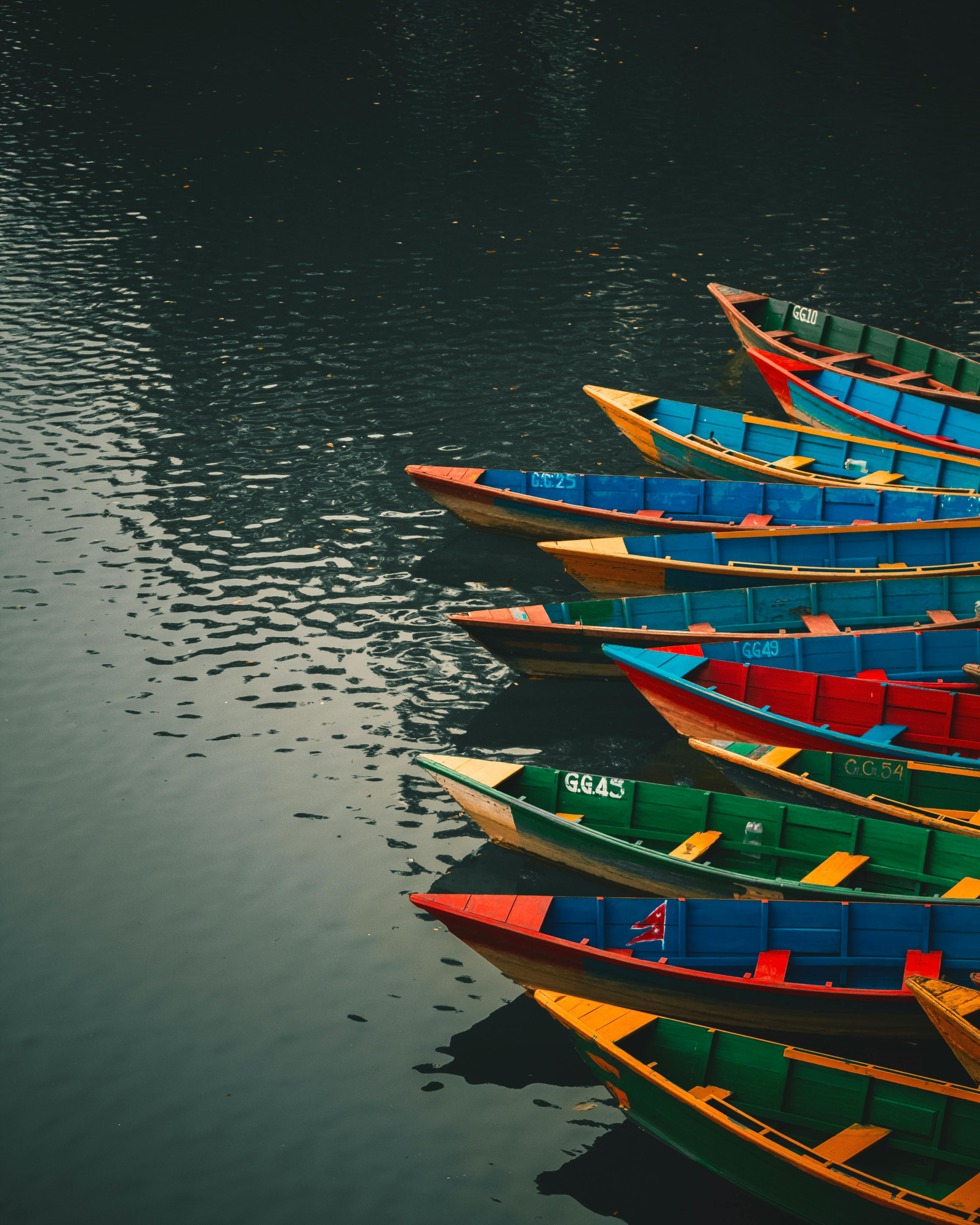 Colorful Wooden Boats in Water · Free Stock Photo