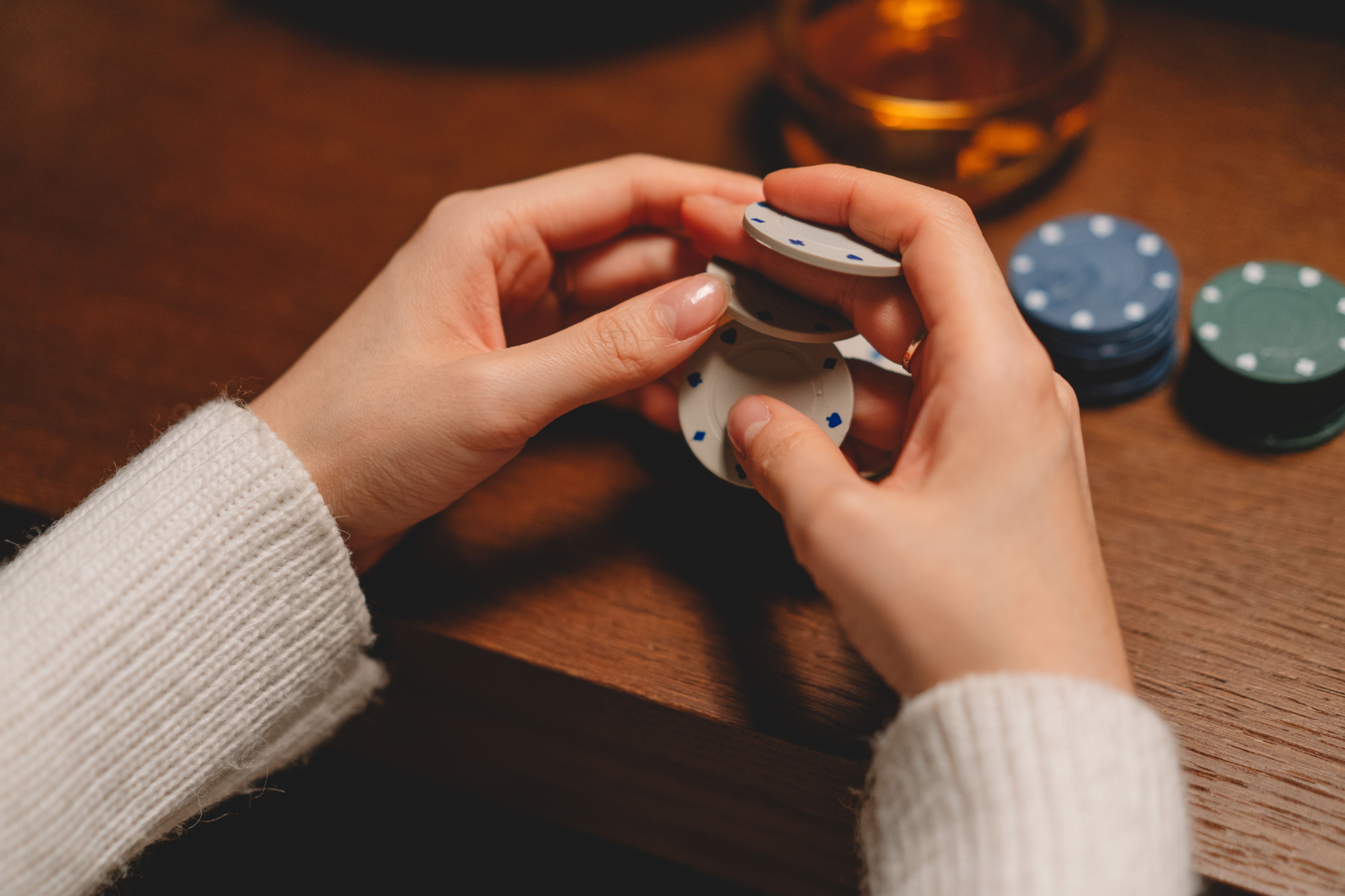 Person Shuffling Cards Free Stock Photo