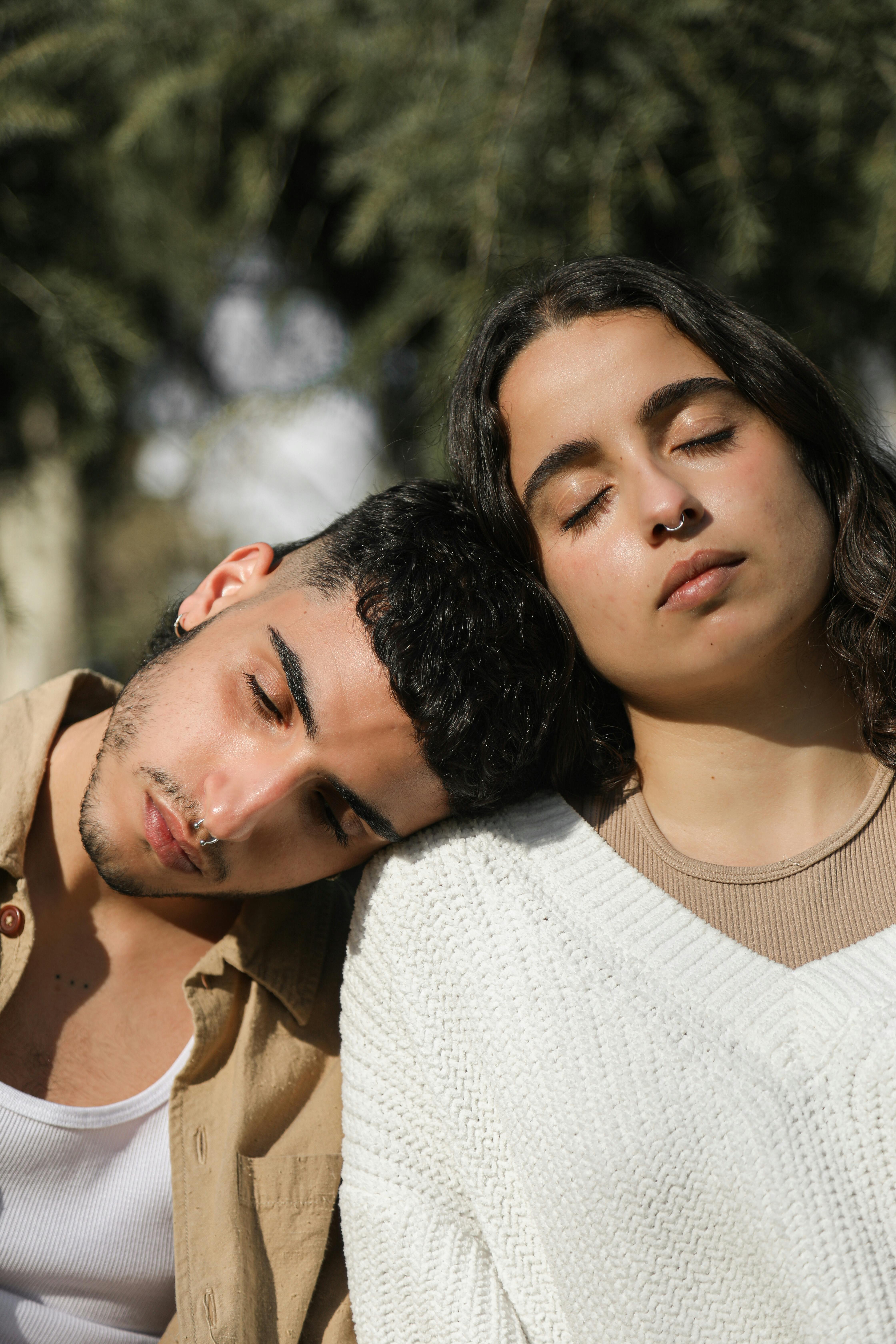 A Man Leaning on the Woman's Shoulder · Free Stock Photo