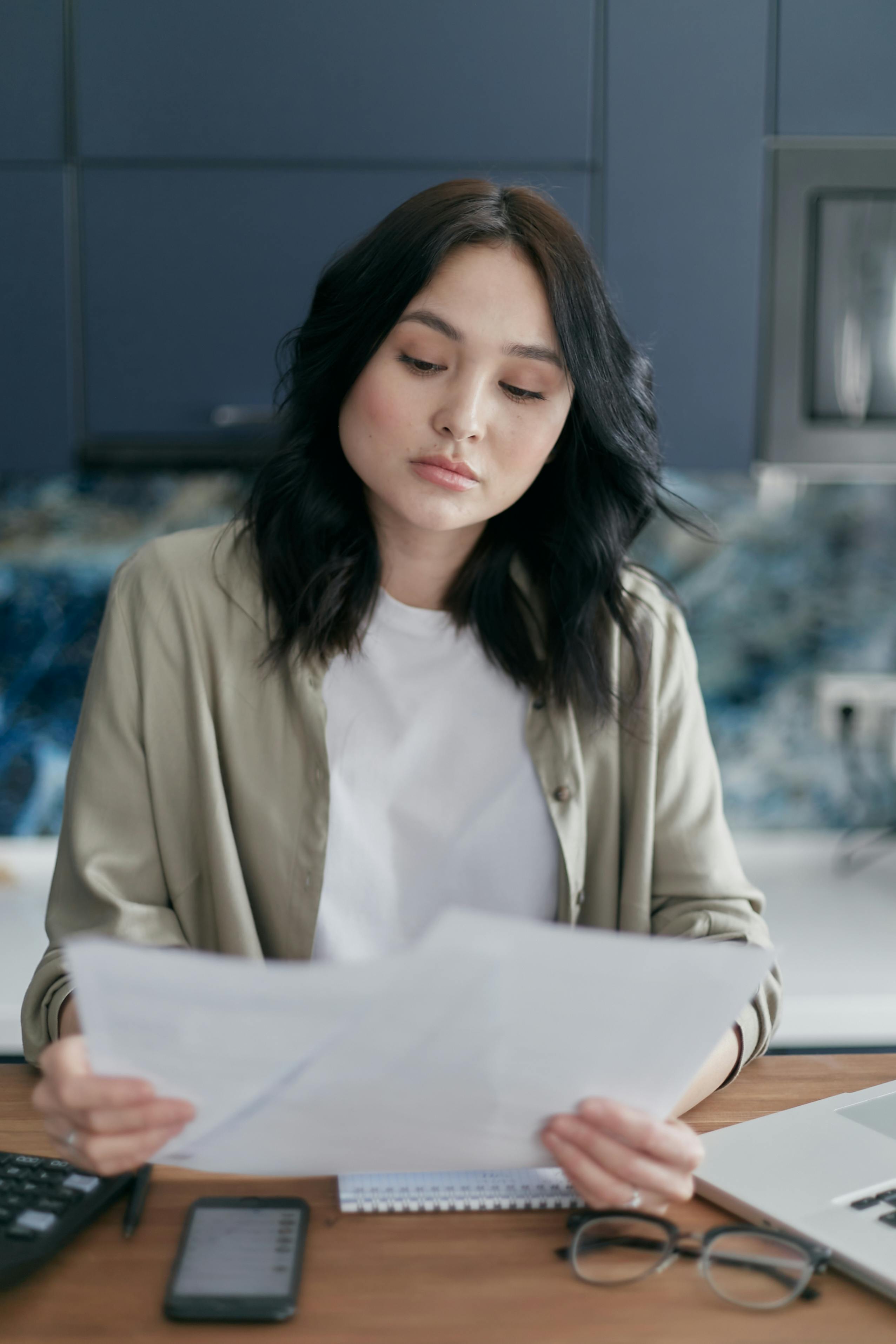 Woman Budgeting Her Bills · Free Stock Photo