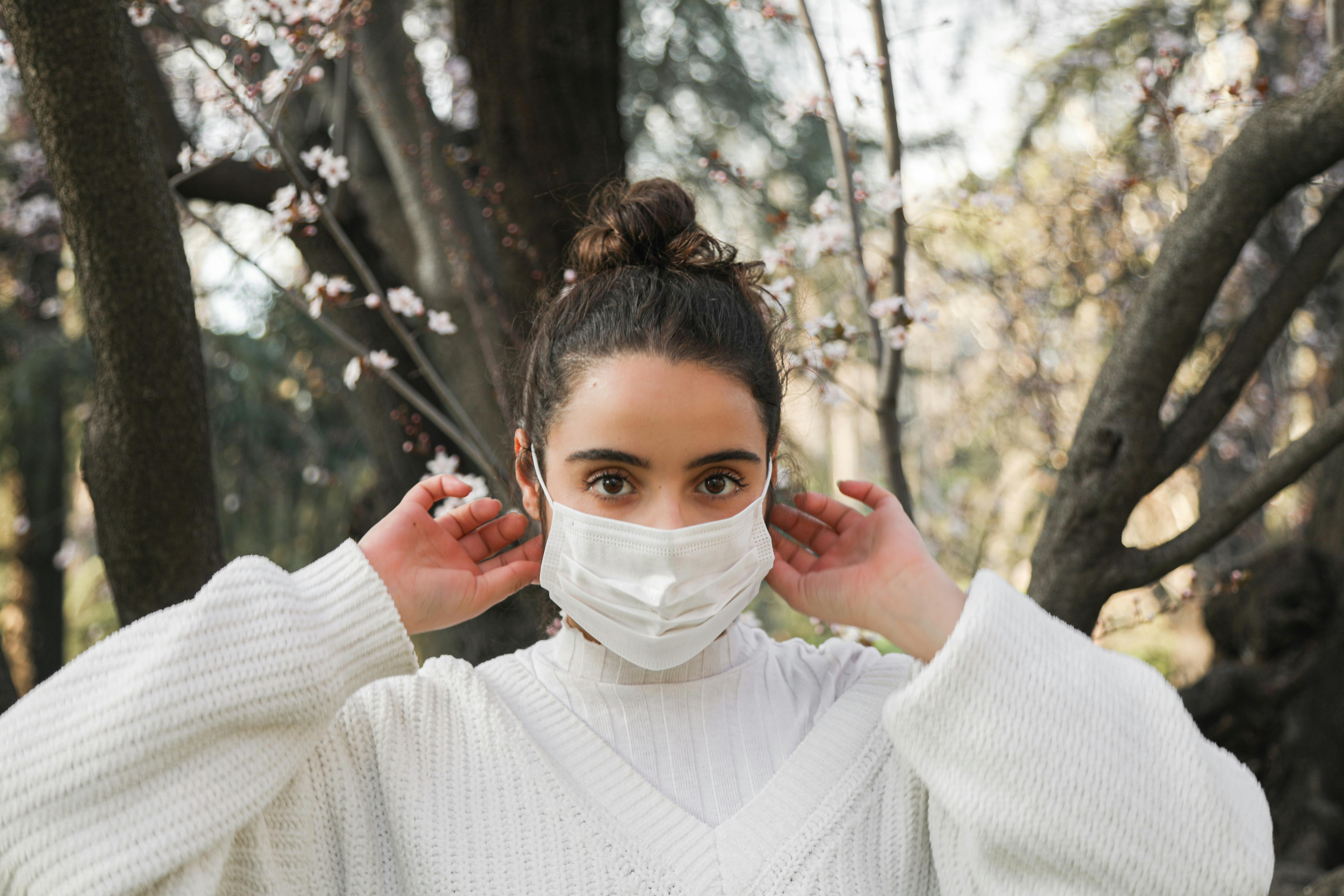 A Woman Wearing white Face Mask · Free Stock Photo