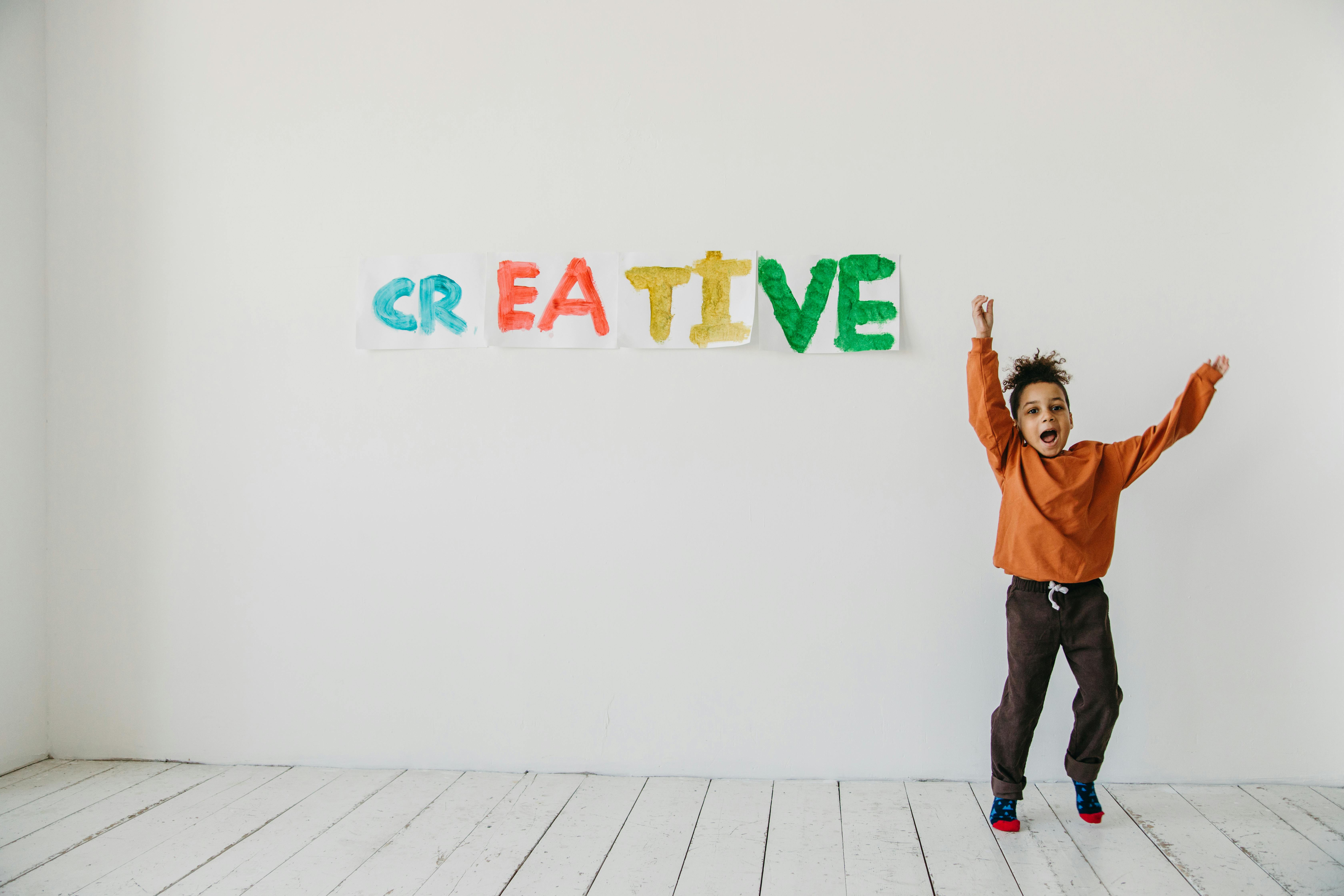 Boy Standing Near a Wall · Free Stock Photo
