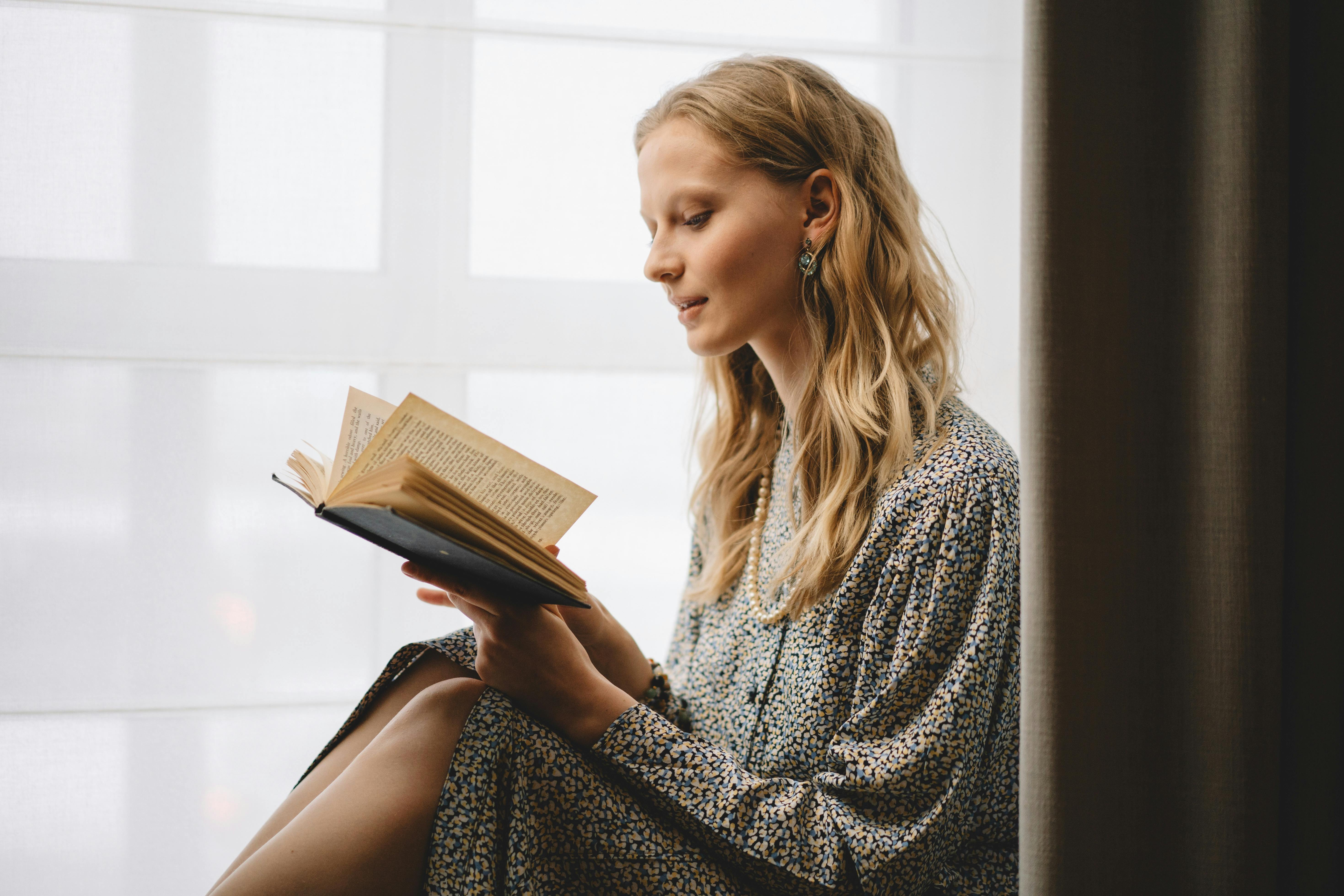 A Woman Reading a Book · Free Stock Photo