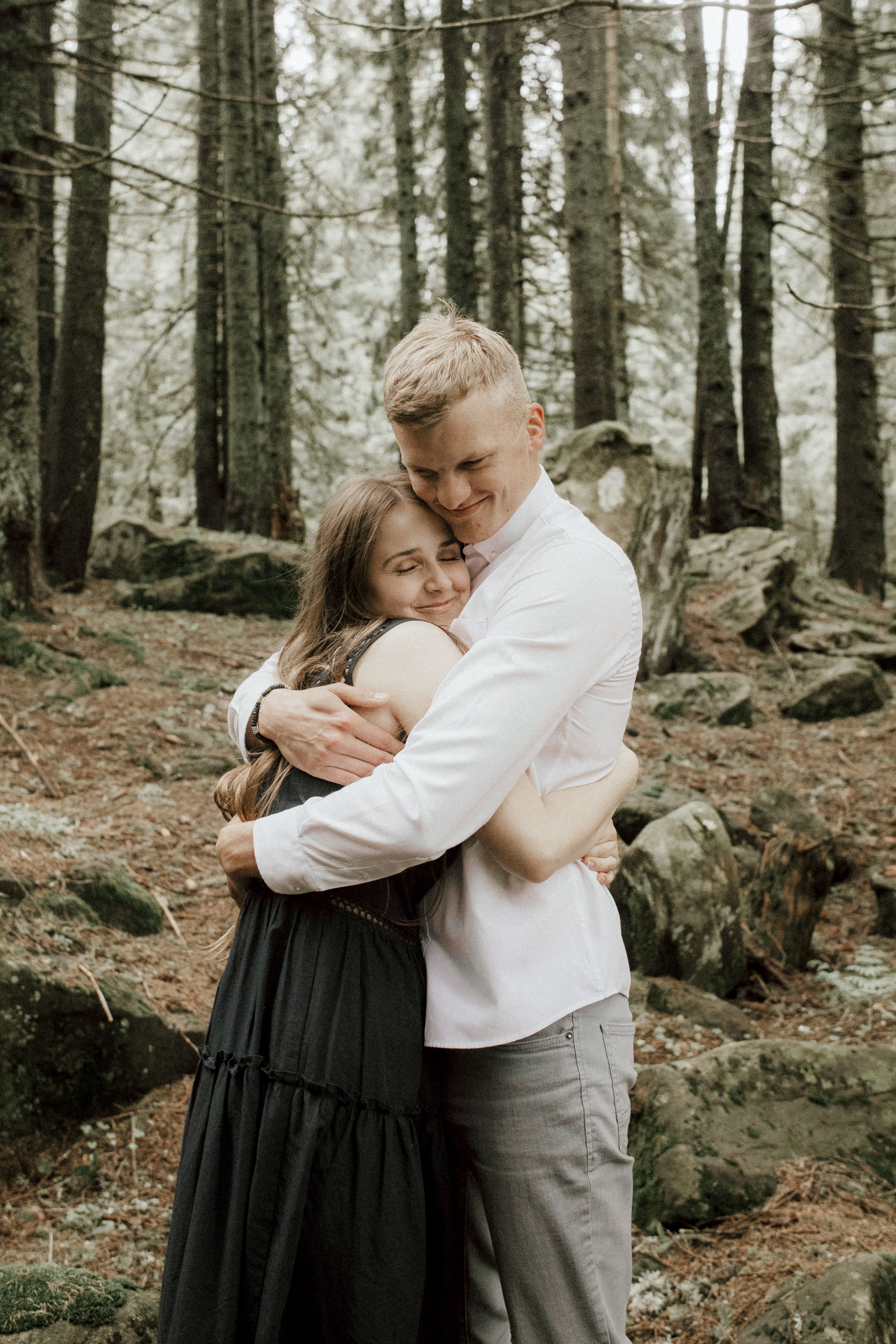 Couple Hugging Near the Trees · Free Stock Photo