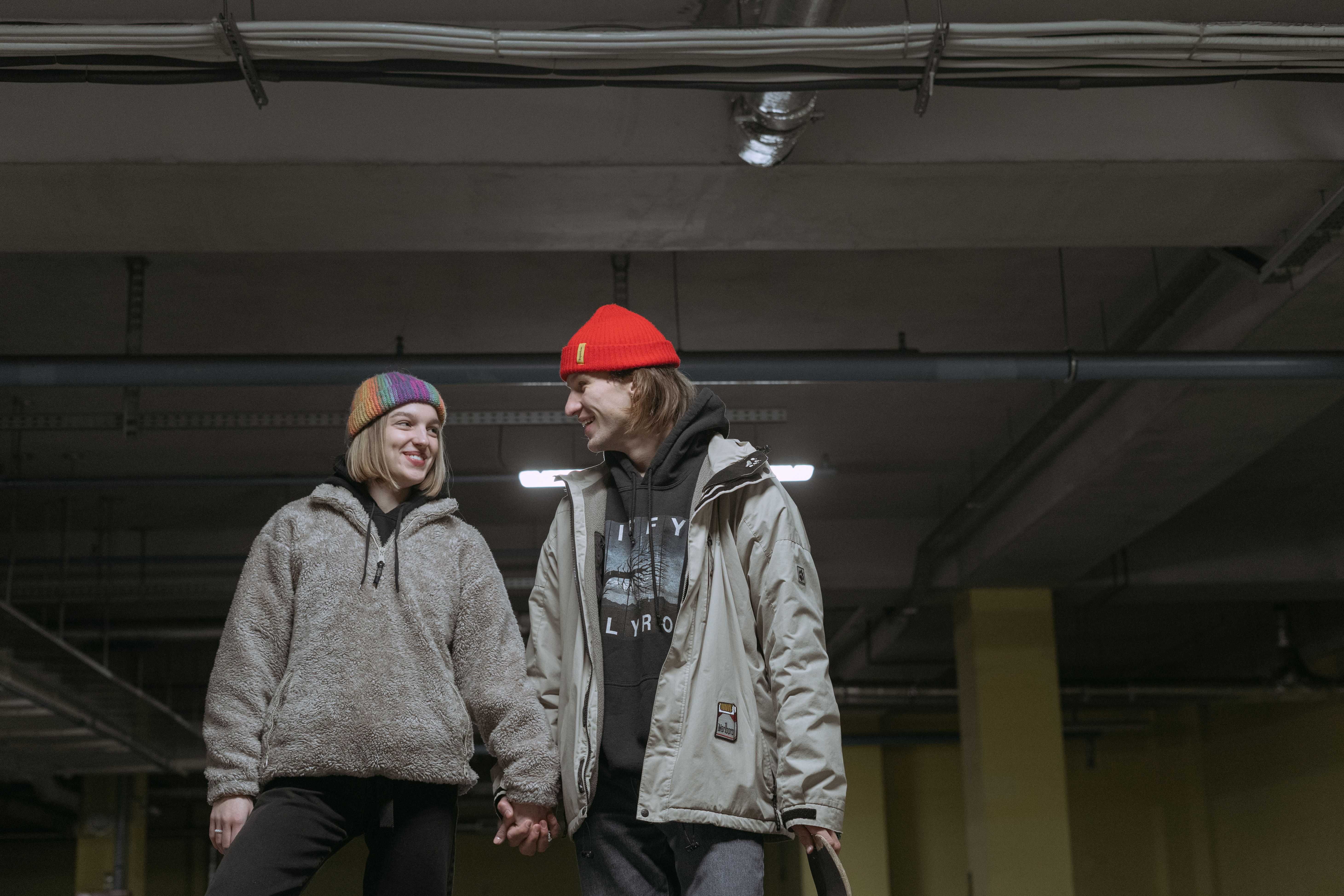 People Wearing Winter Clothing Walking in the Parking Lot · Free Stock ...