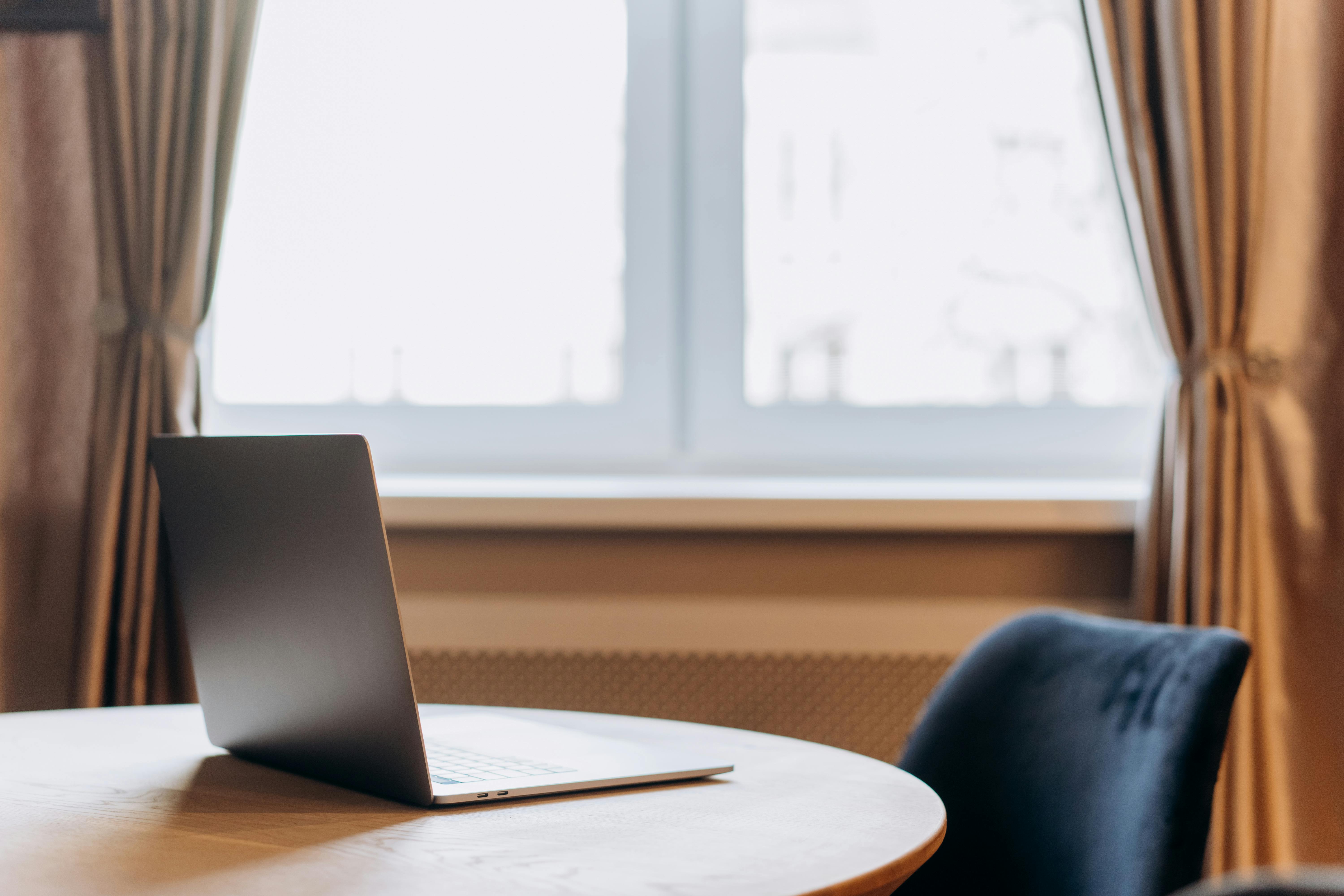 A Laptop on a Table · Free Stock Photo