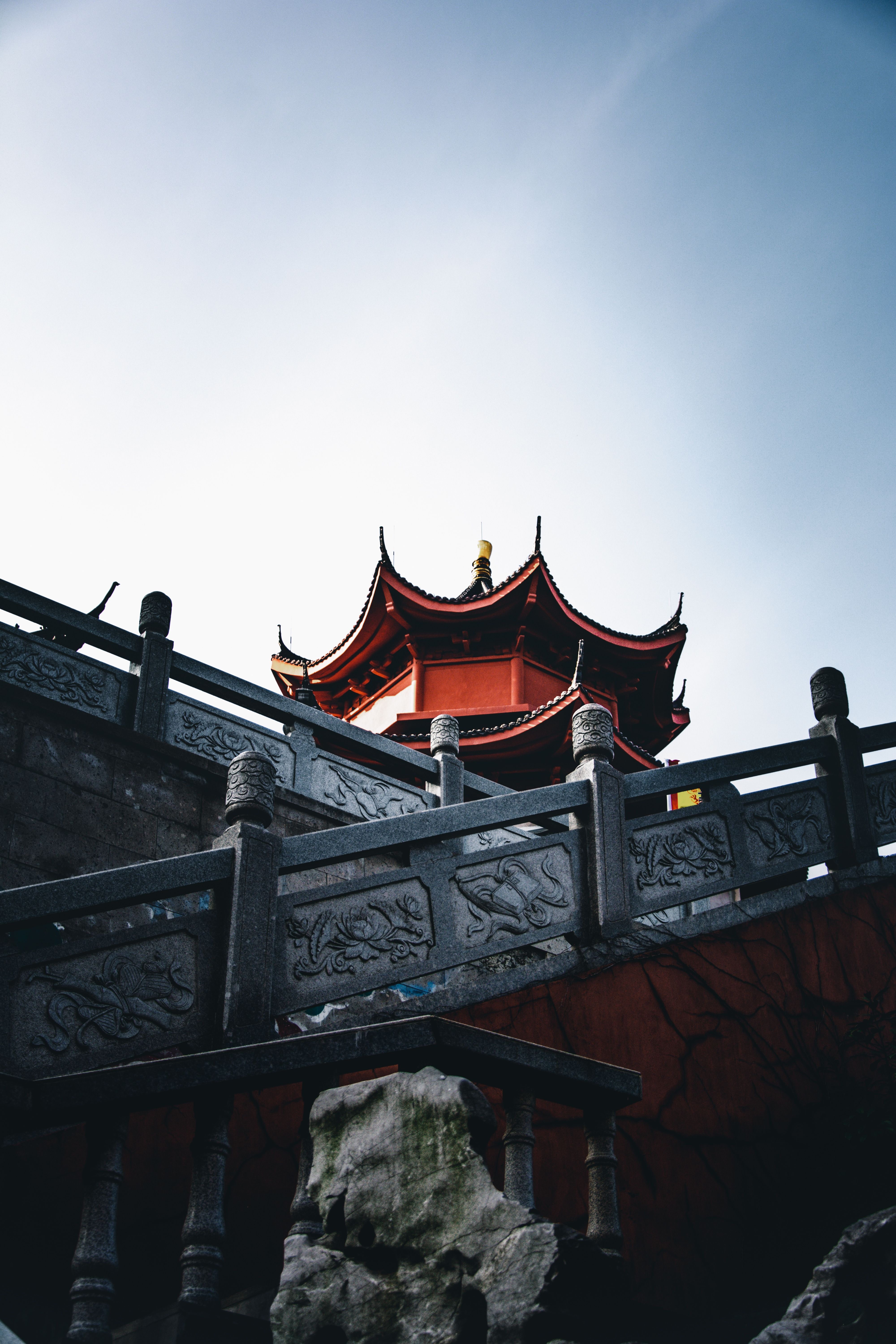 Traditional Asian building with pagoda roof and stairs · Free Stock Photo