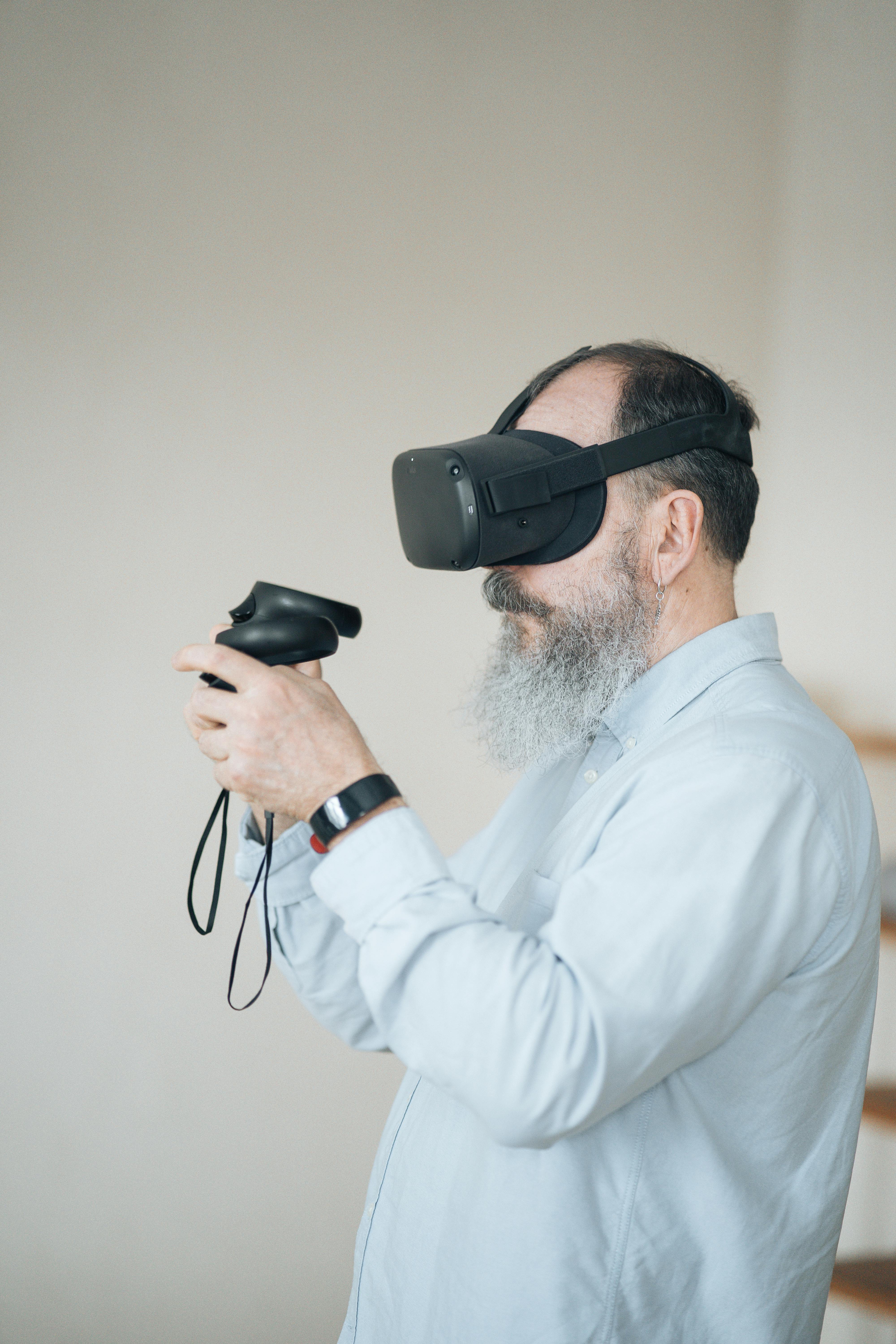 Man in White Dress Shirt Playing Video Game with an Oculus · Free Stock ...