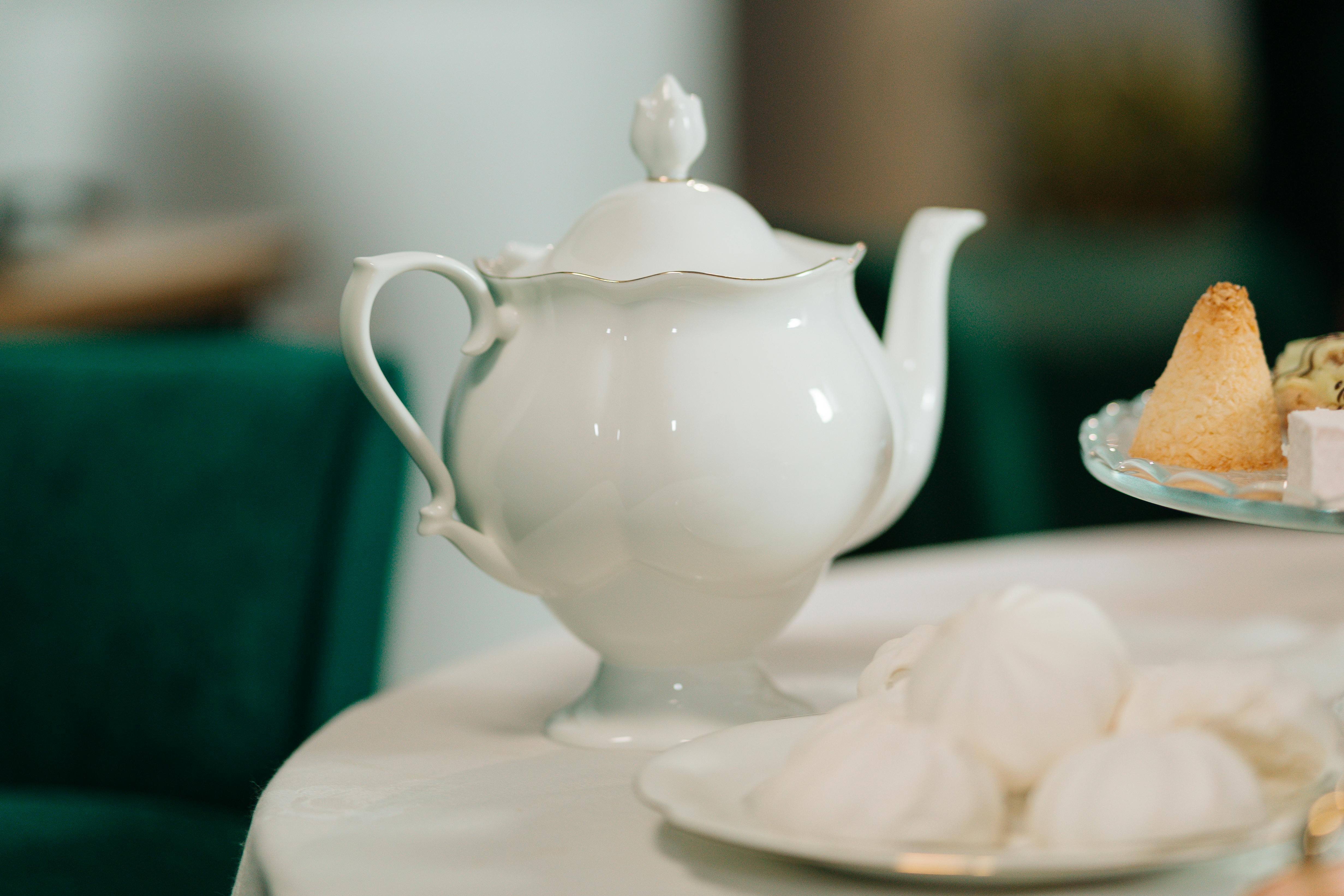 Close-up of Porcelain Teapot on Table · Free Stock Photo