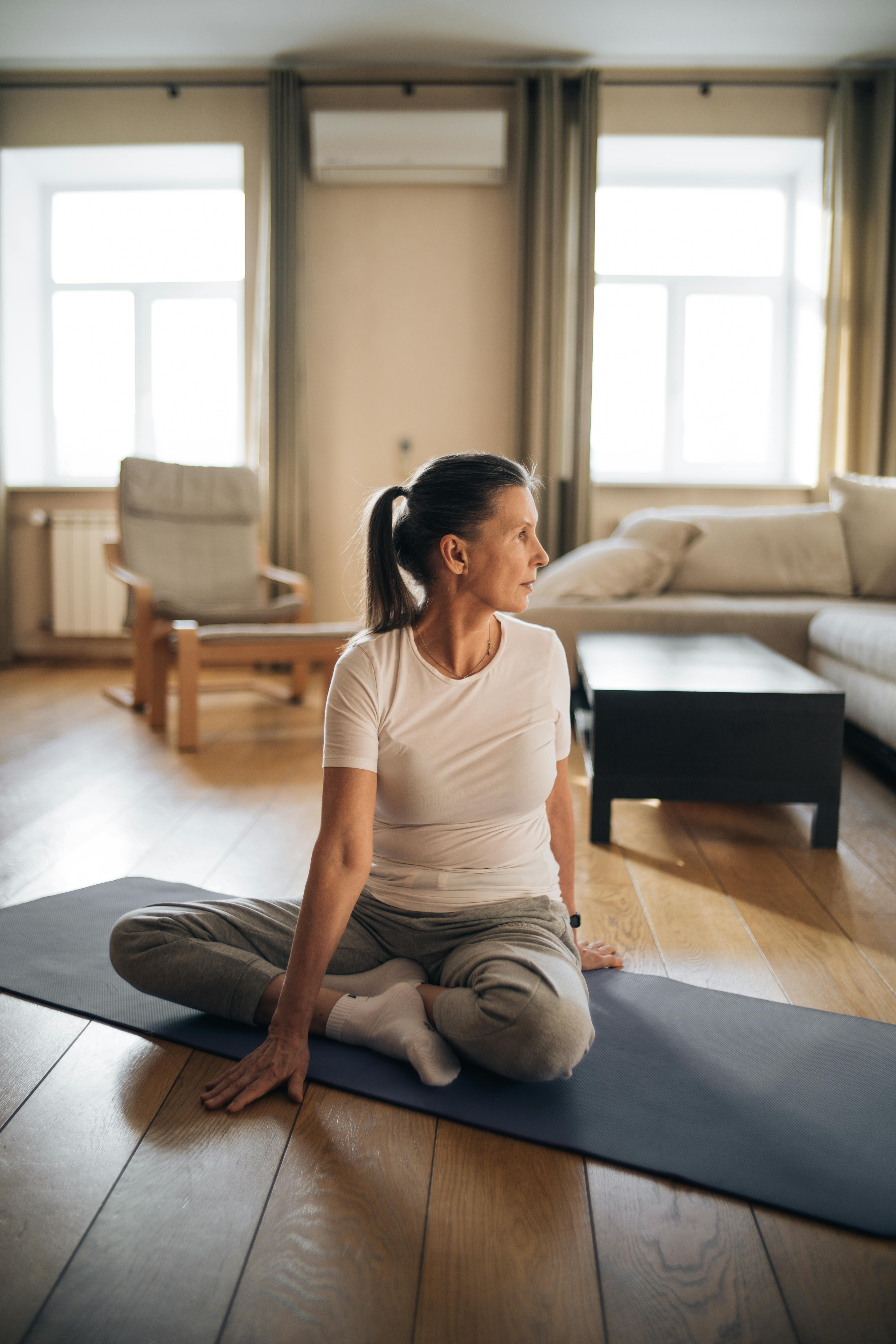 Woman Doing Yoga at Home while Vlogging · Free Stock Photo