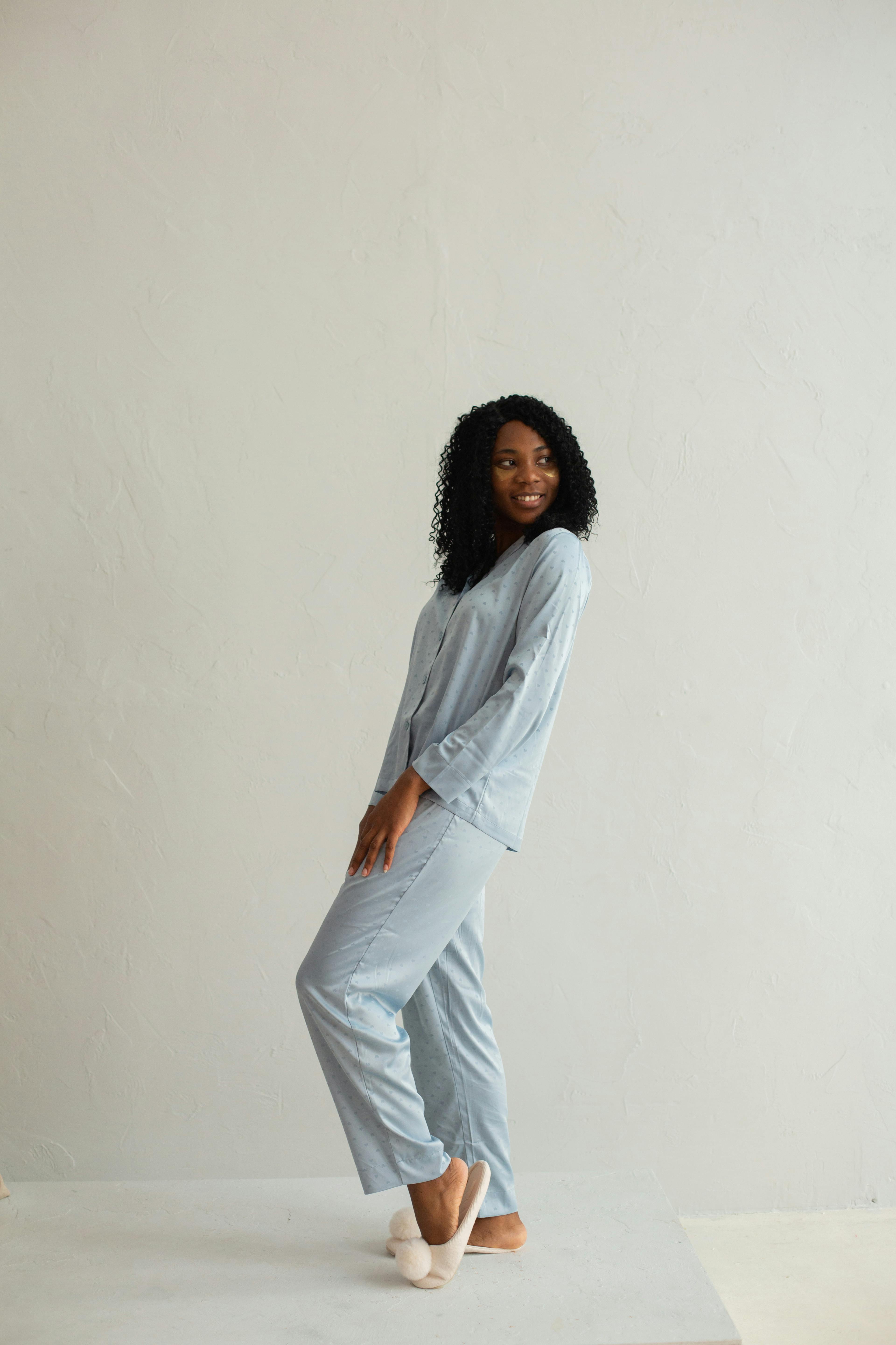 Smiling Woman in Home Wear Posing on White Studio Background · Free ...