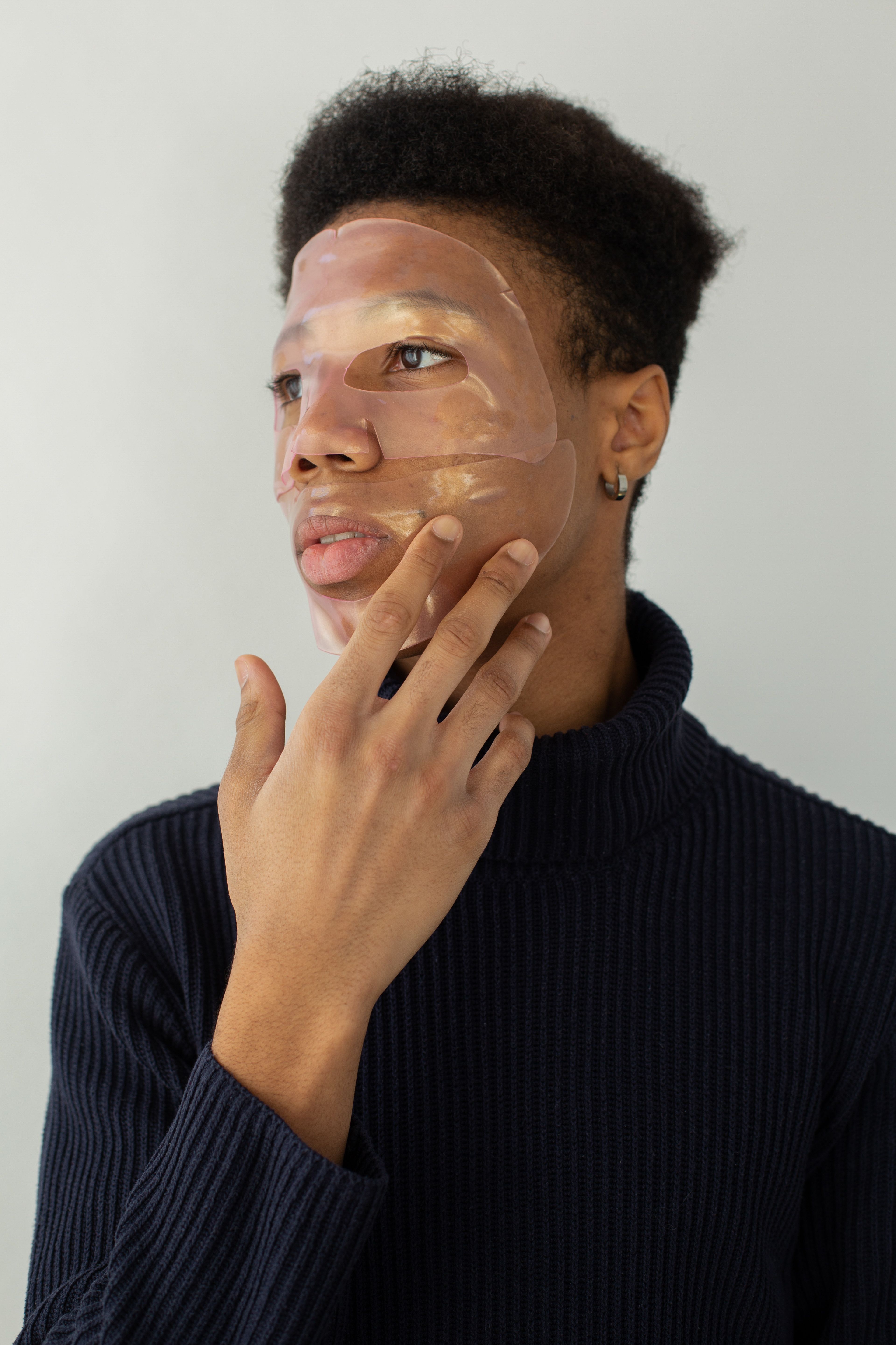 Man Applying Cosmetic Mask on His Face · Free Stock Photo