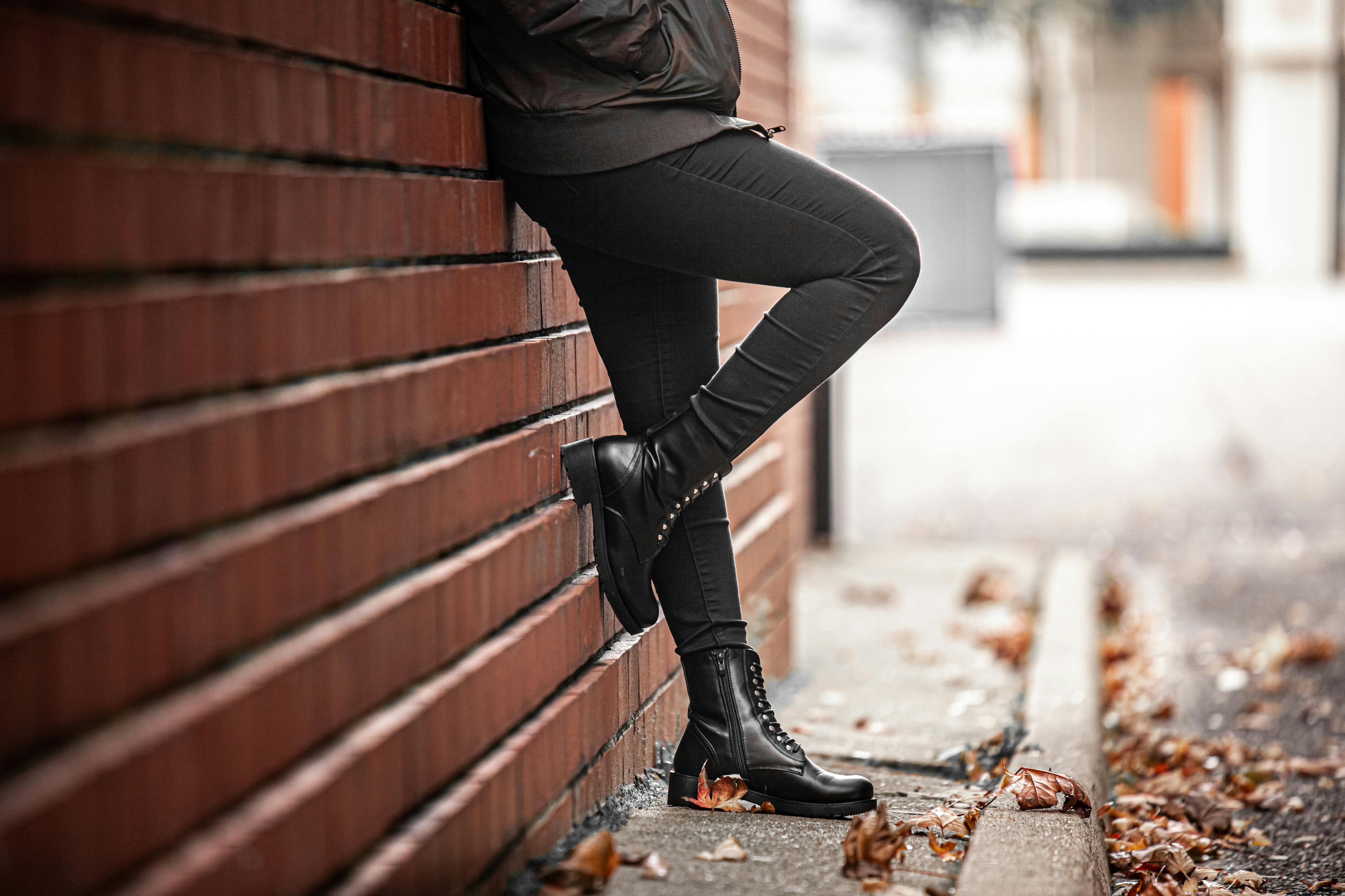 Untied Leather Boots on the Ground · Free Stock Photo