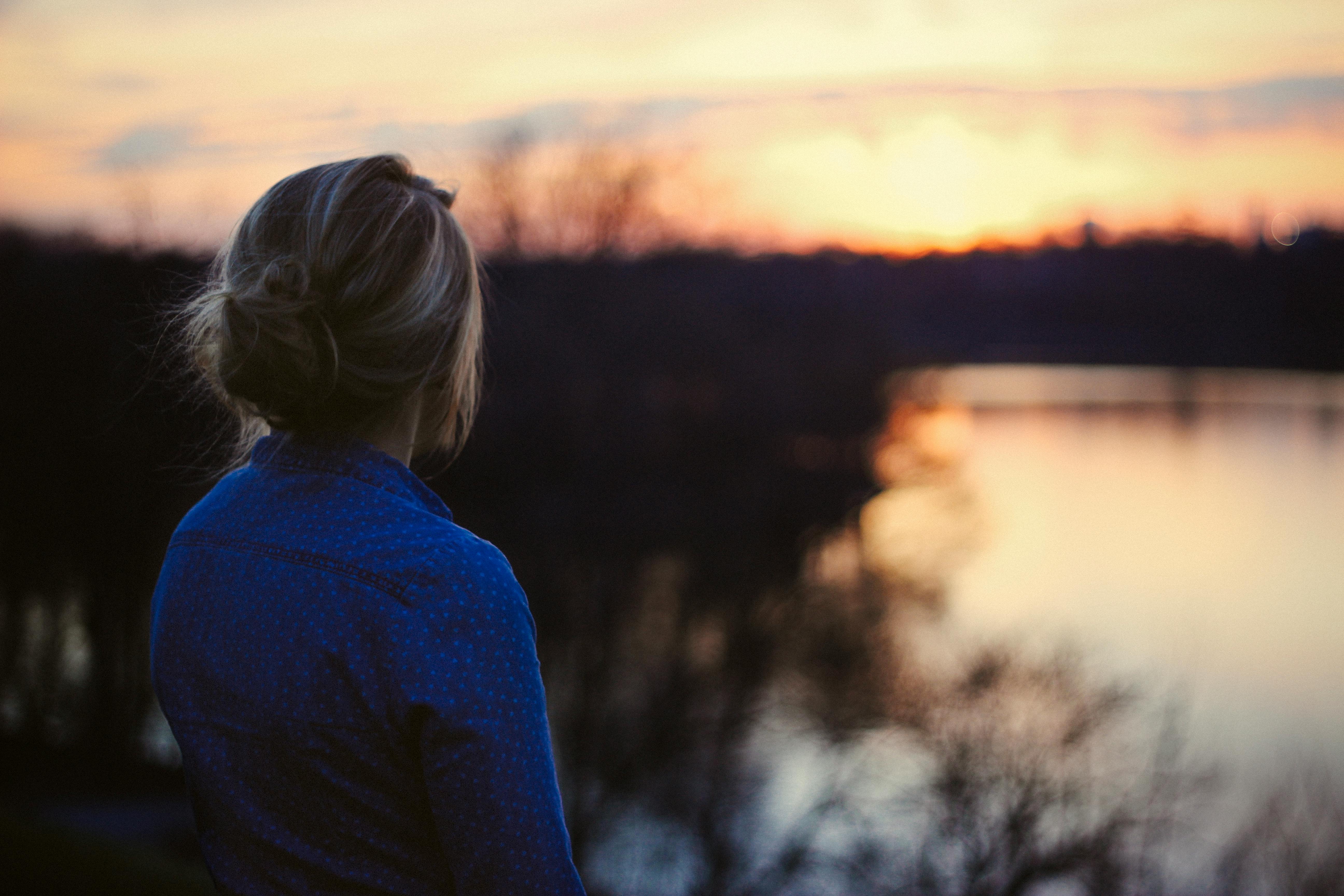 Woman Staring at Lake · Free Stock Photo