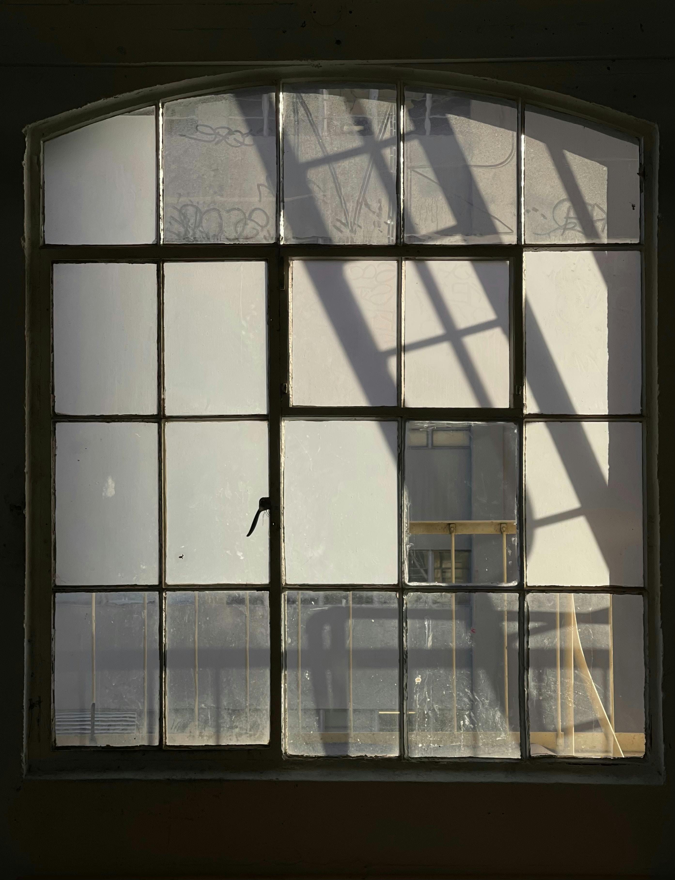 Photo of a Wooden Framed Glass Window · Free Stock Photo