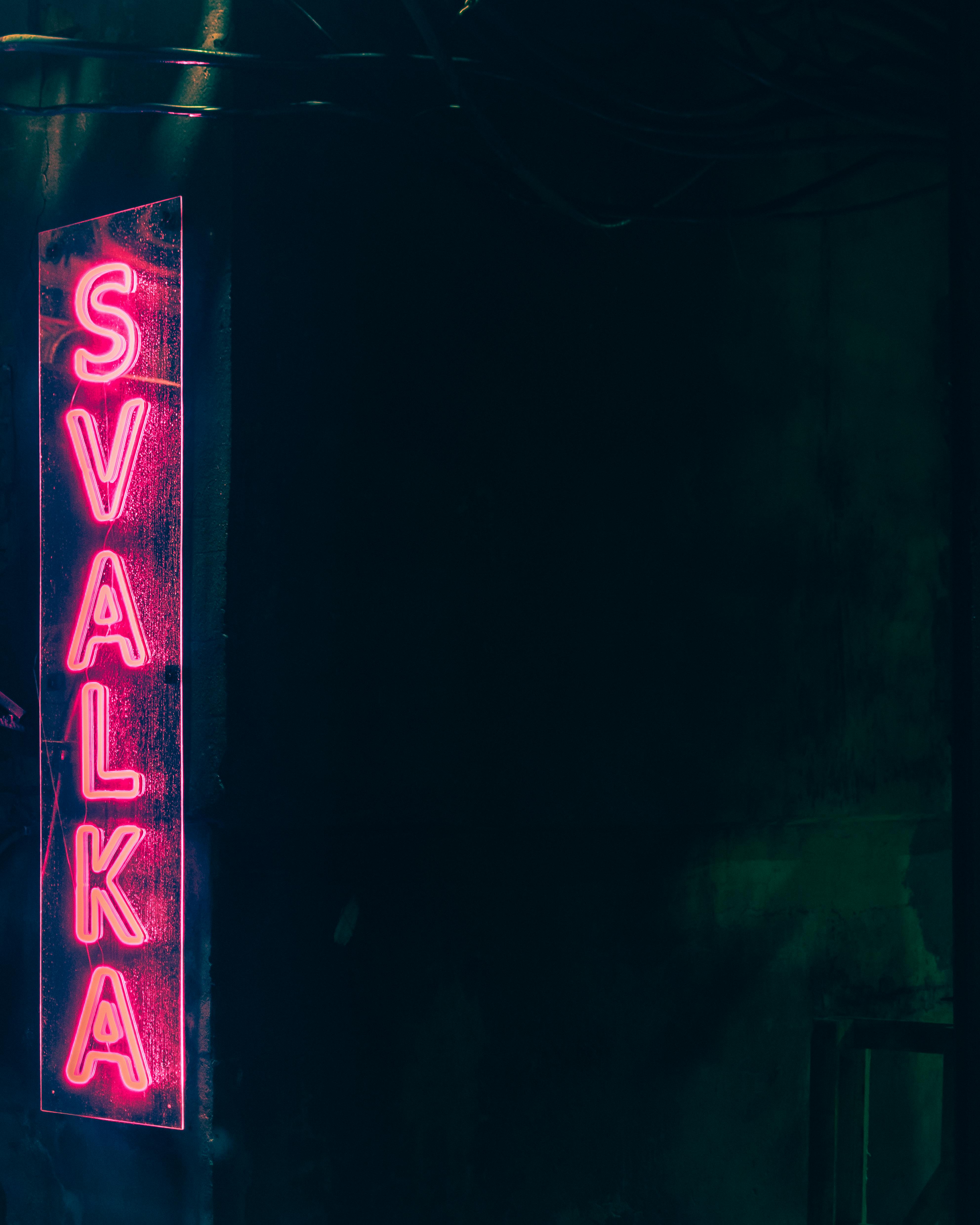 Neon Sign On Building At Night · Free Stock Photo
