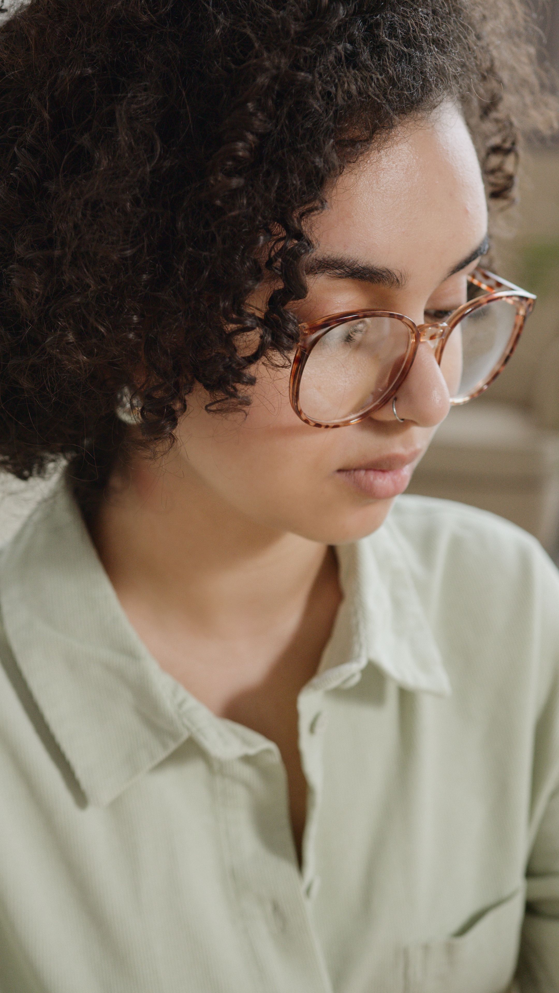 A Shirtless Woman with a Nose Piercing · Free Stock Photo