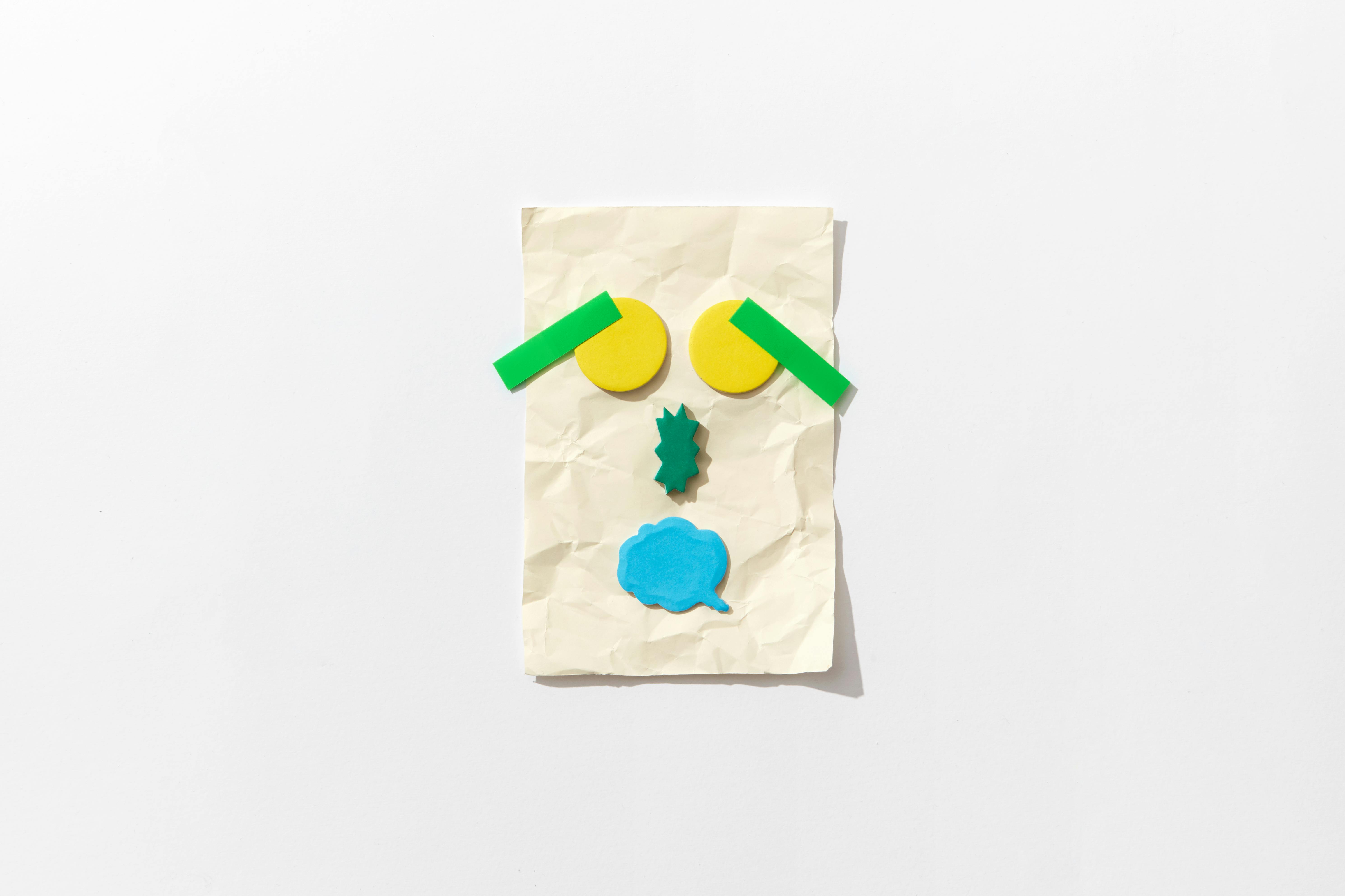 Paper Cutouts Forming a Face · Free Stock Photo