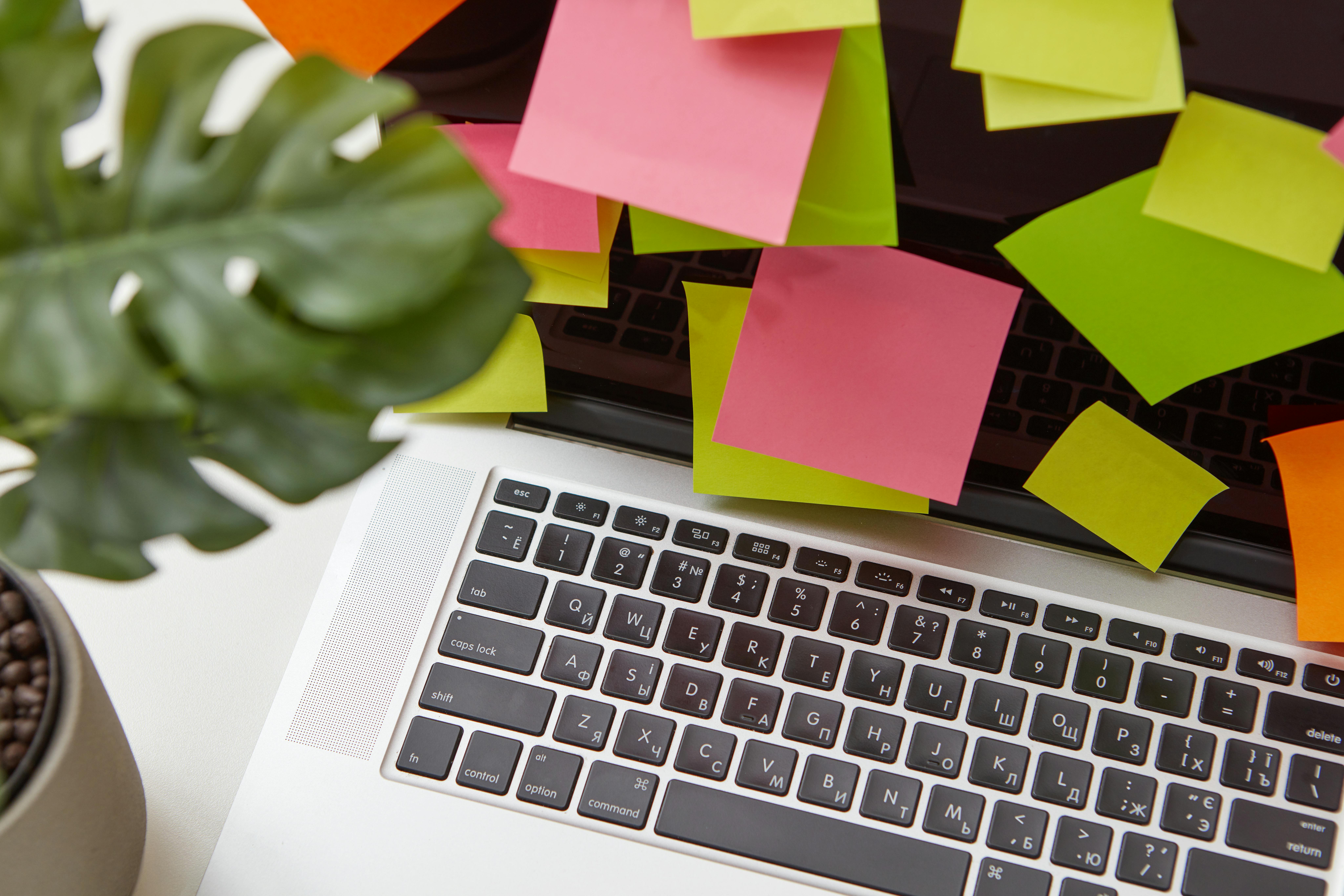 Close Up Photo of a Laptop with Sticky Notes · Free Stock Photo
