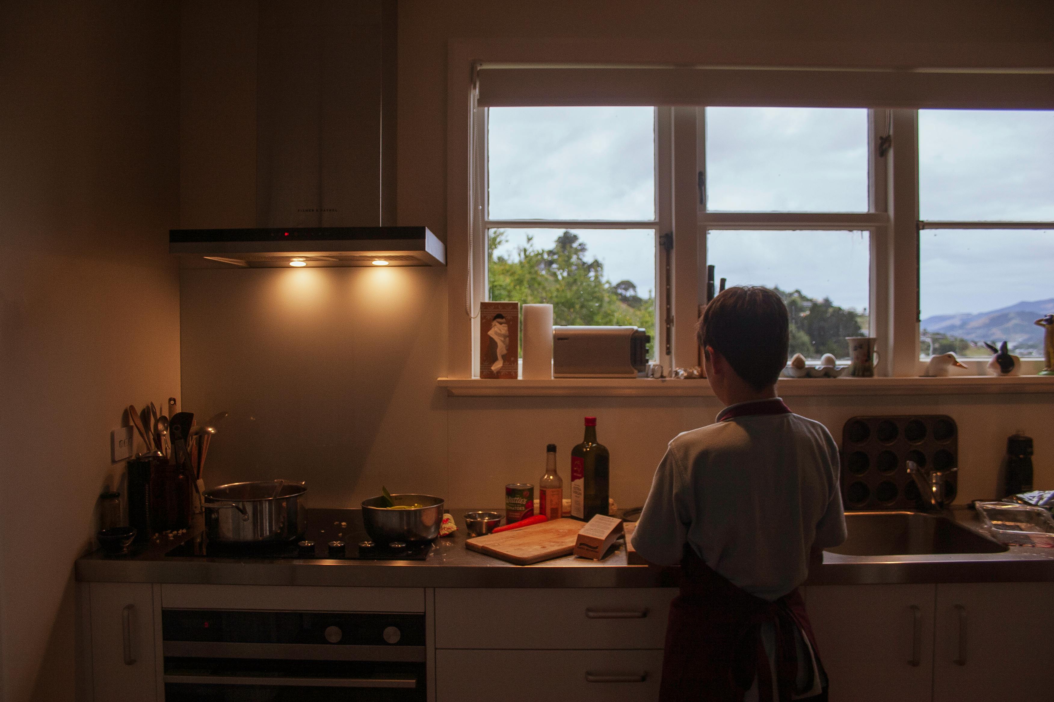 A Boy Cooking in the Kitchen · Free Stock Photo