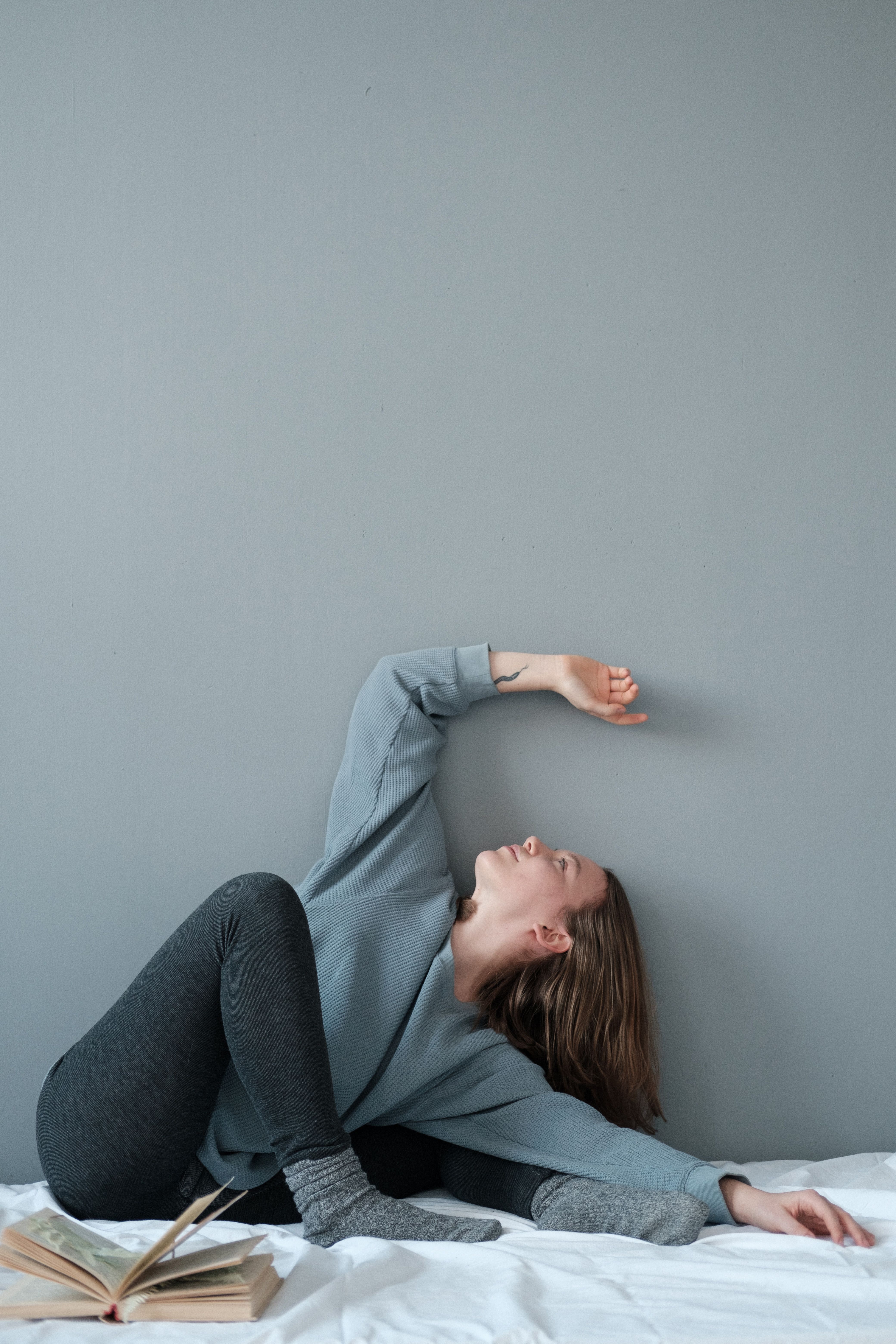 Photo of a Woman Sitting while Looking Up · Free Stock Photo
