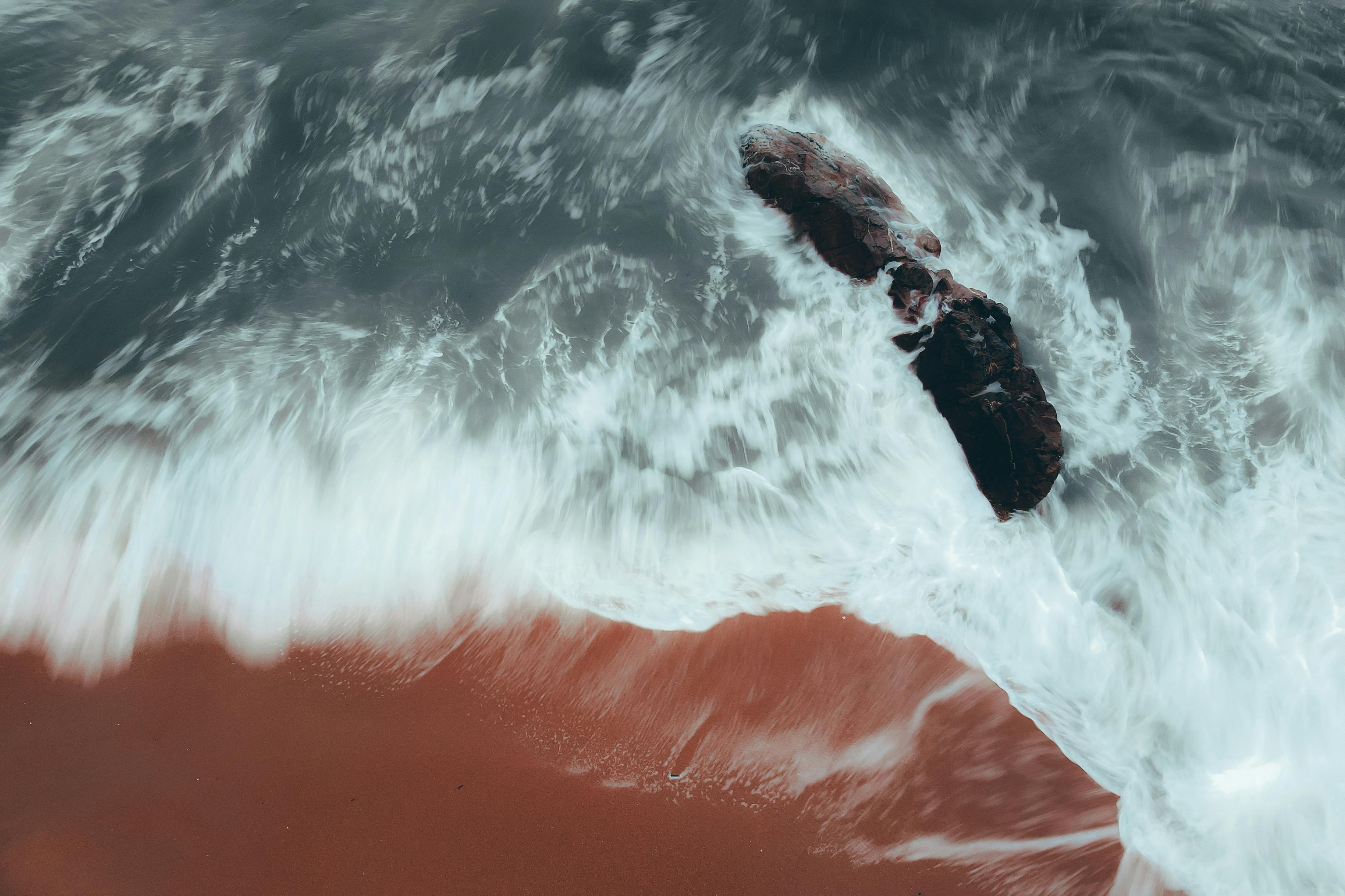 Seashore Wave Crashing on Rock Formation · Free Stock Photo