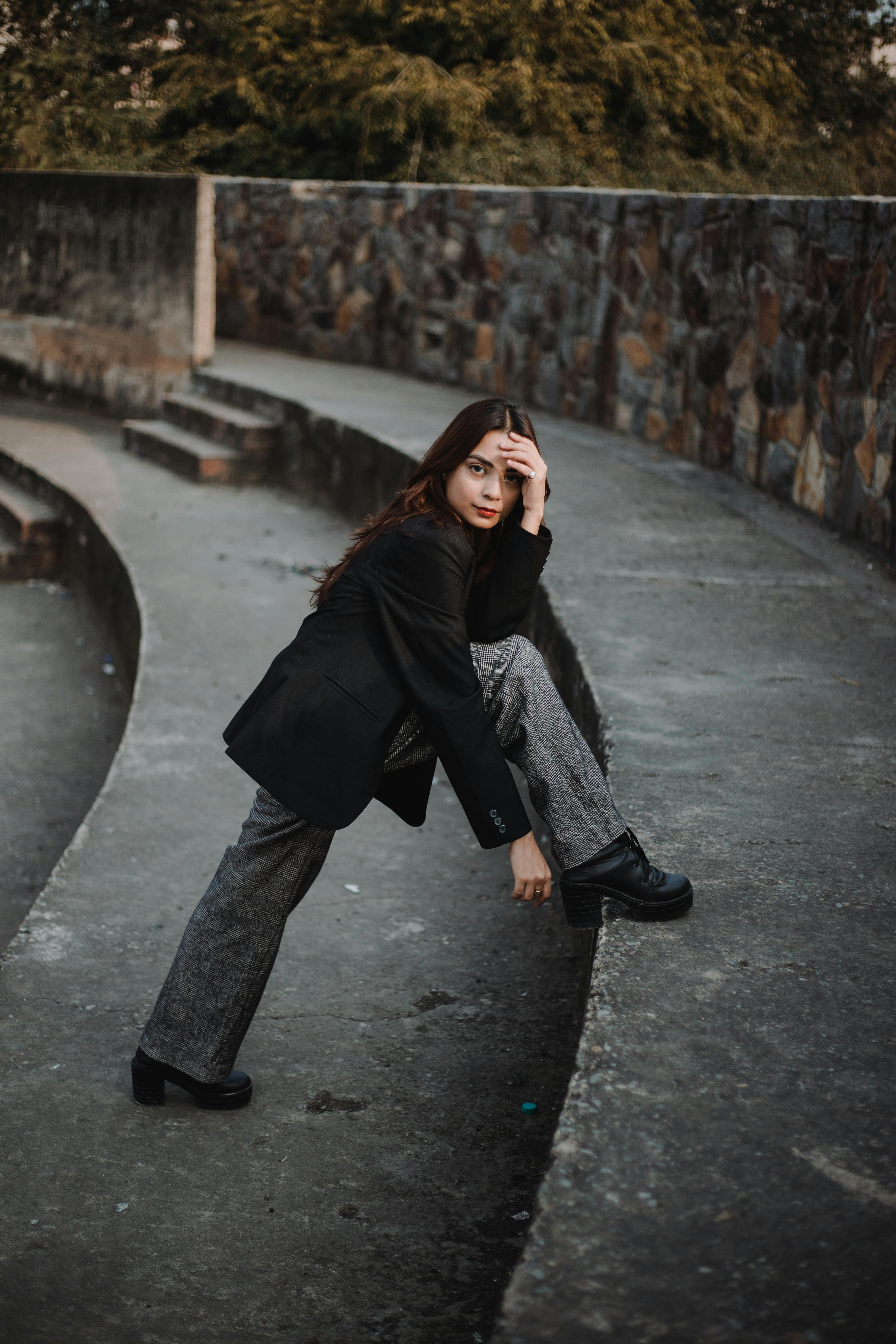 Diverse stylish people on steps · Free Stock Photo