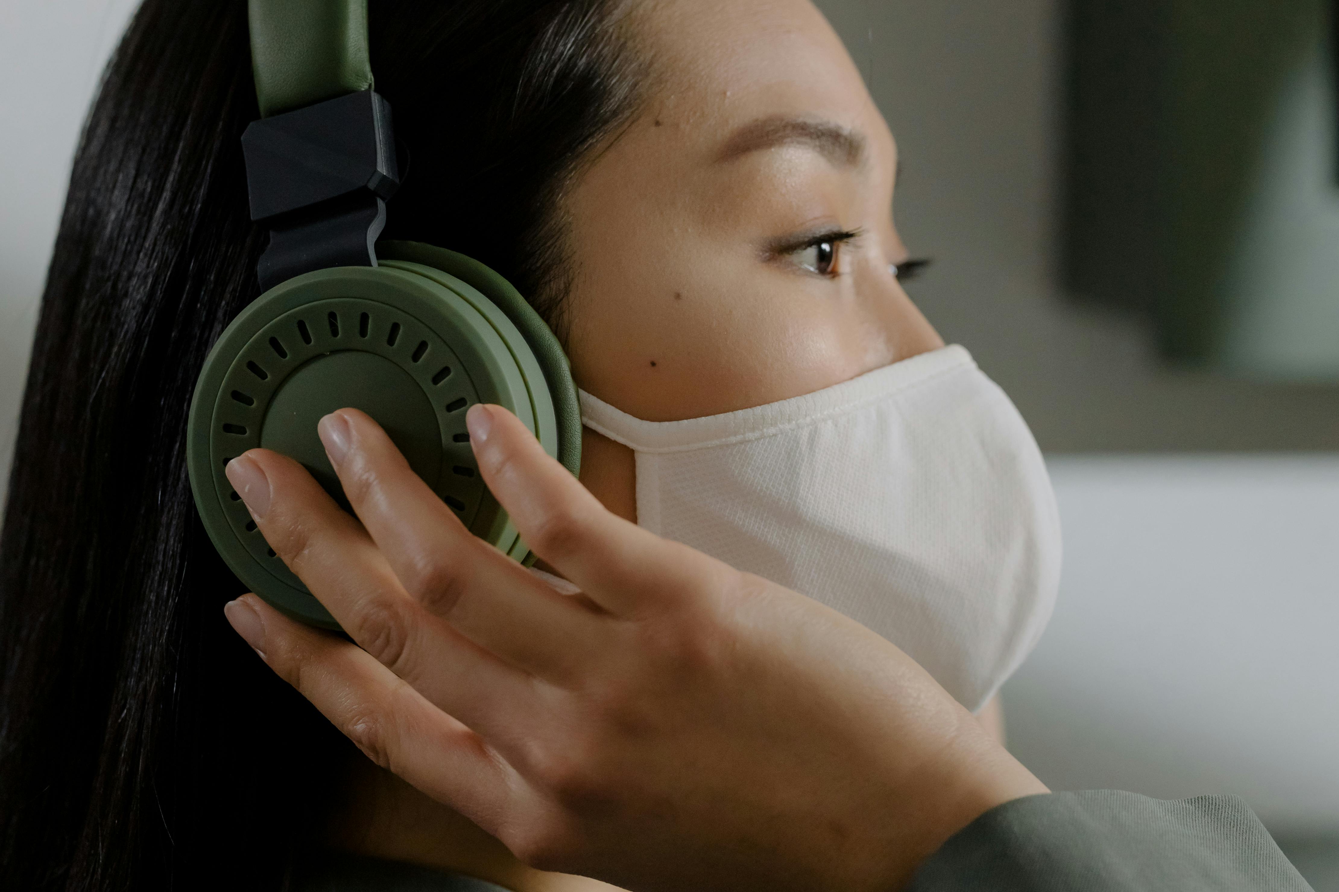 Woman Listening with Headphones on Head · Free Stock Photo