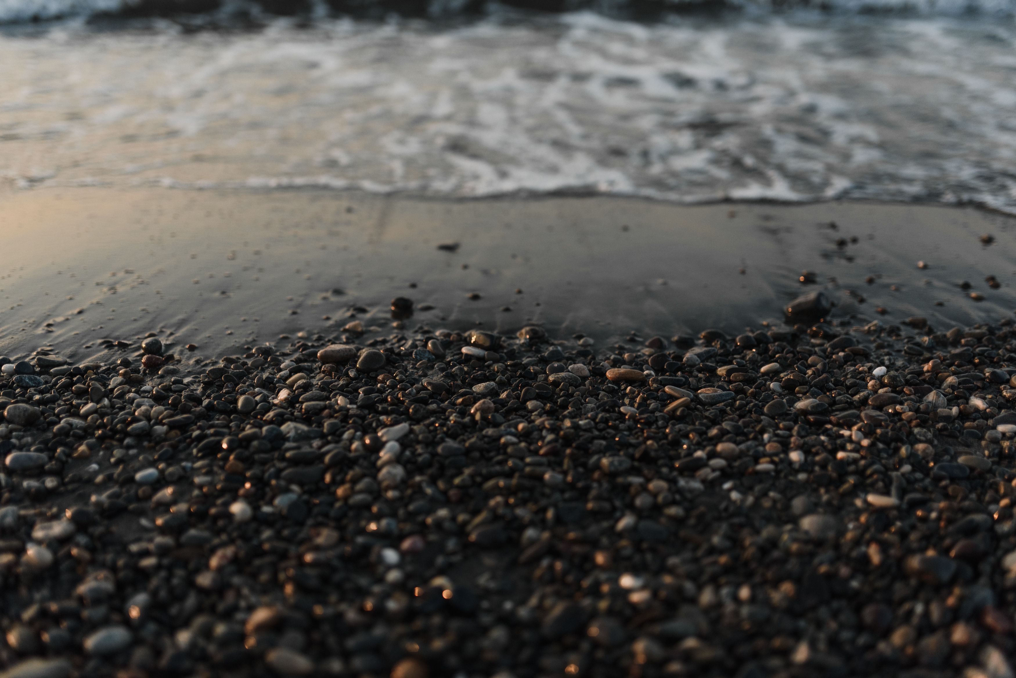 Pebbles on Beach Shore · Free Stock Photo