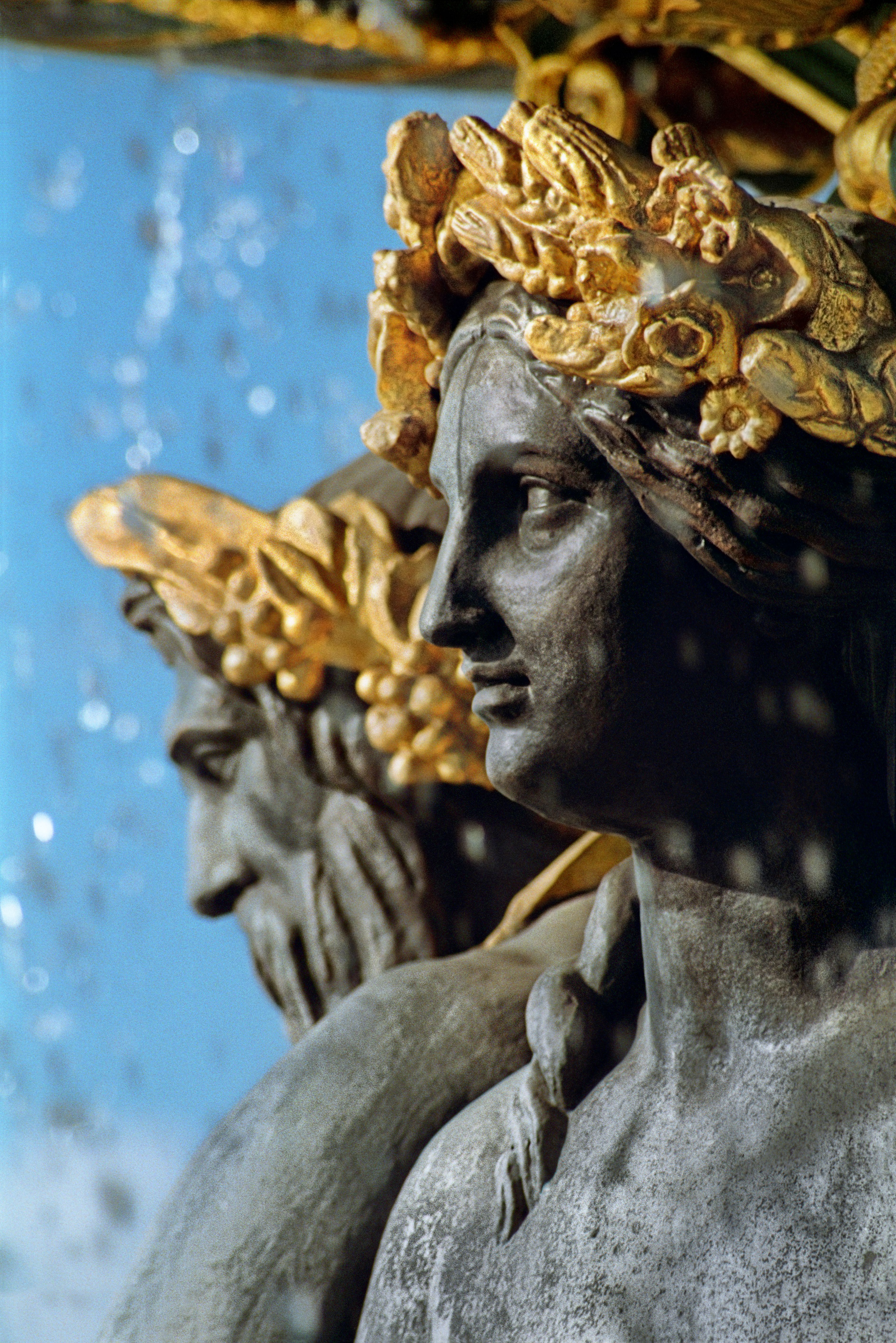 A Gray and Gold Statues · Free Stock Photo