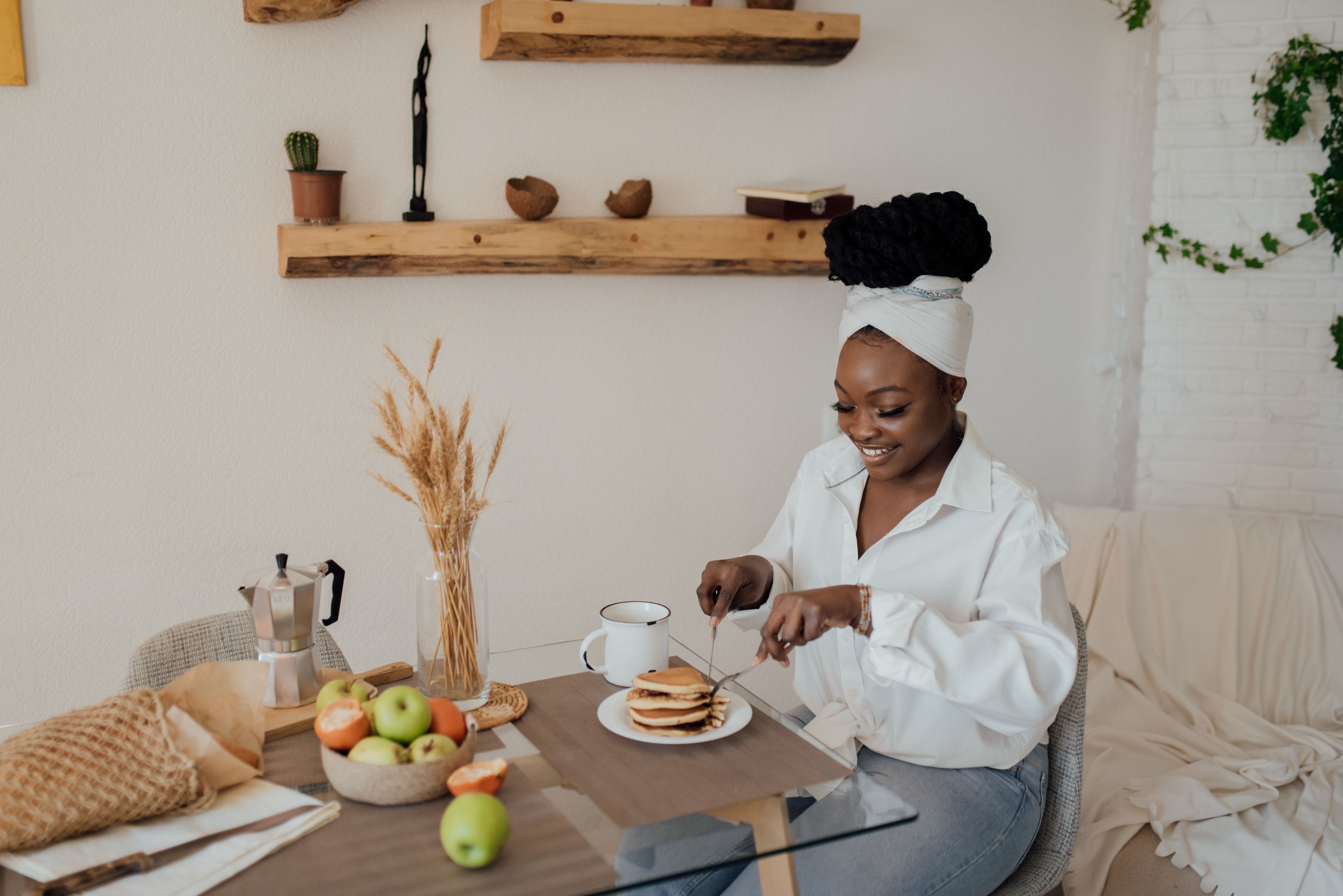 A Woman Eating Pancakes · Free Stock Photo