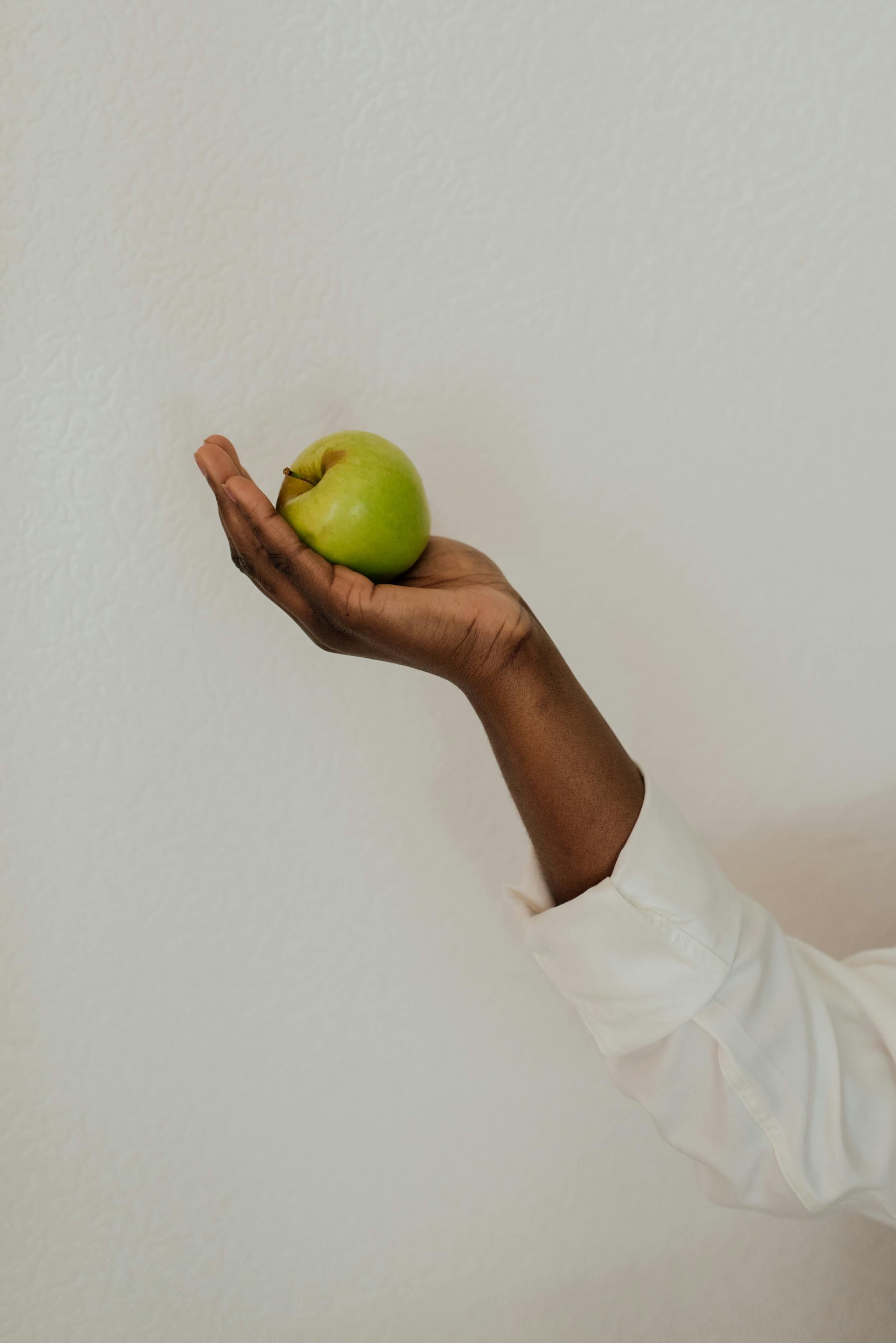 Person Holding Apple Fruit · Free Stock Photo