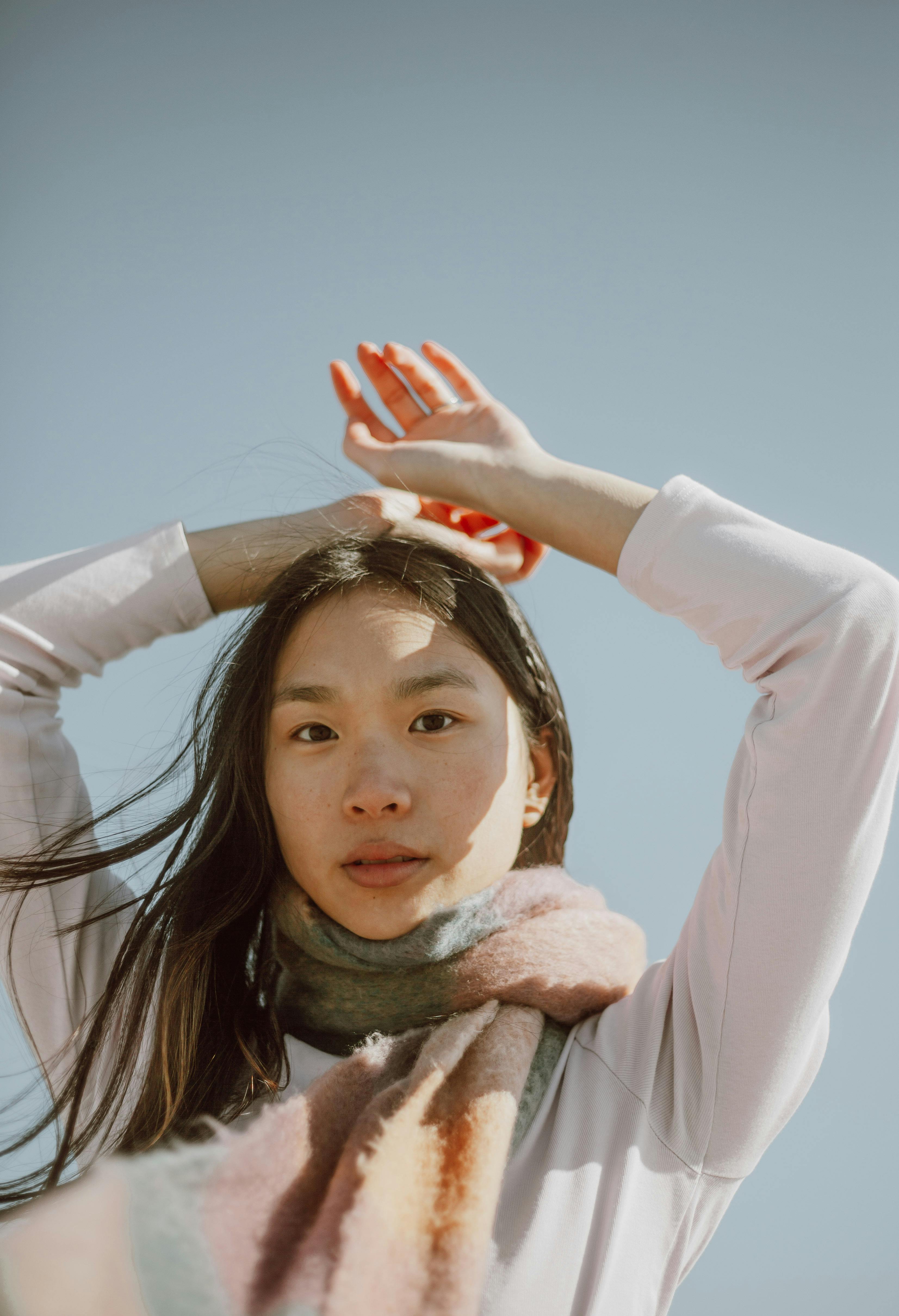 Photo of Woman Raising Her Both Arms · Free Stock Photo